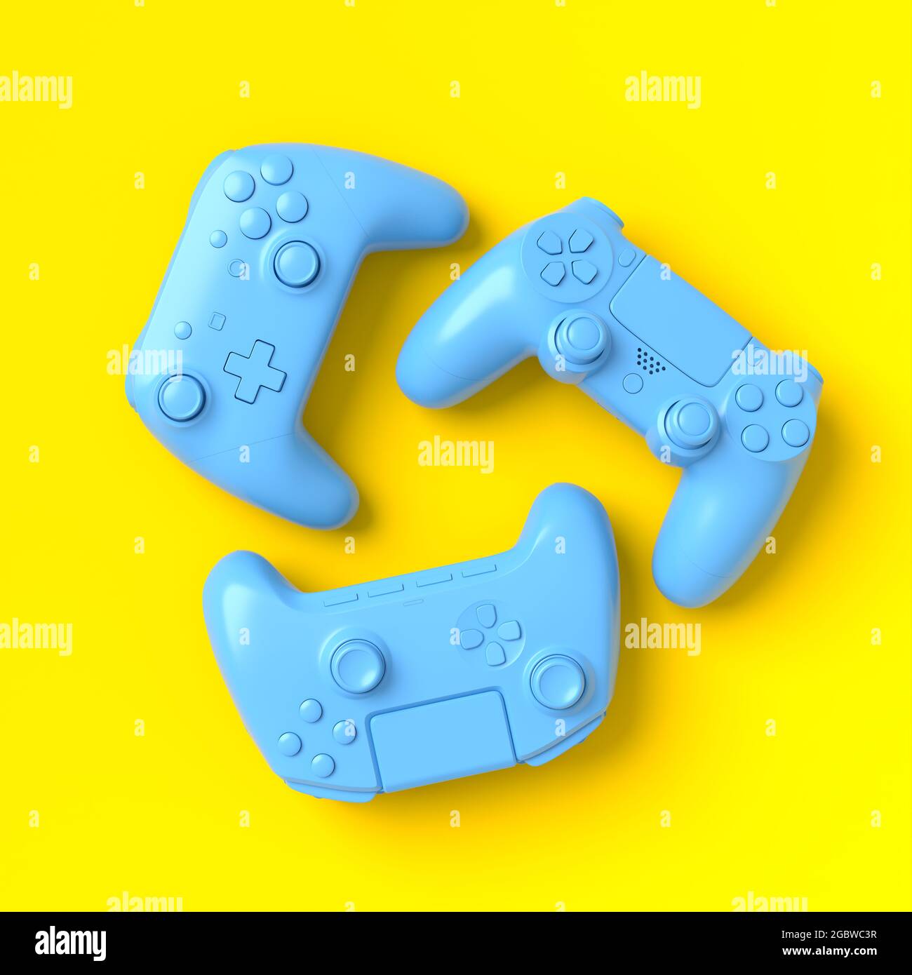 Set of lying monochrome blue gamer joysticks or gamepads on yellow ...