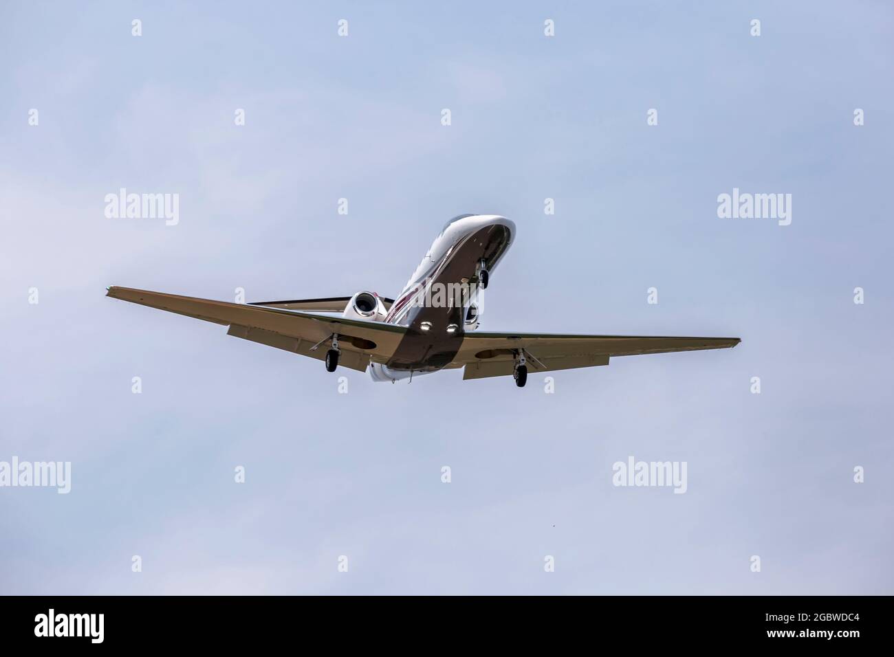 photograph of an airplane few seconds before landing Stock Photo - Alamy