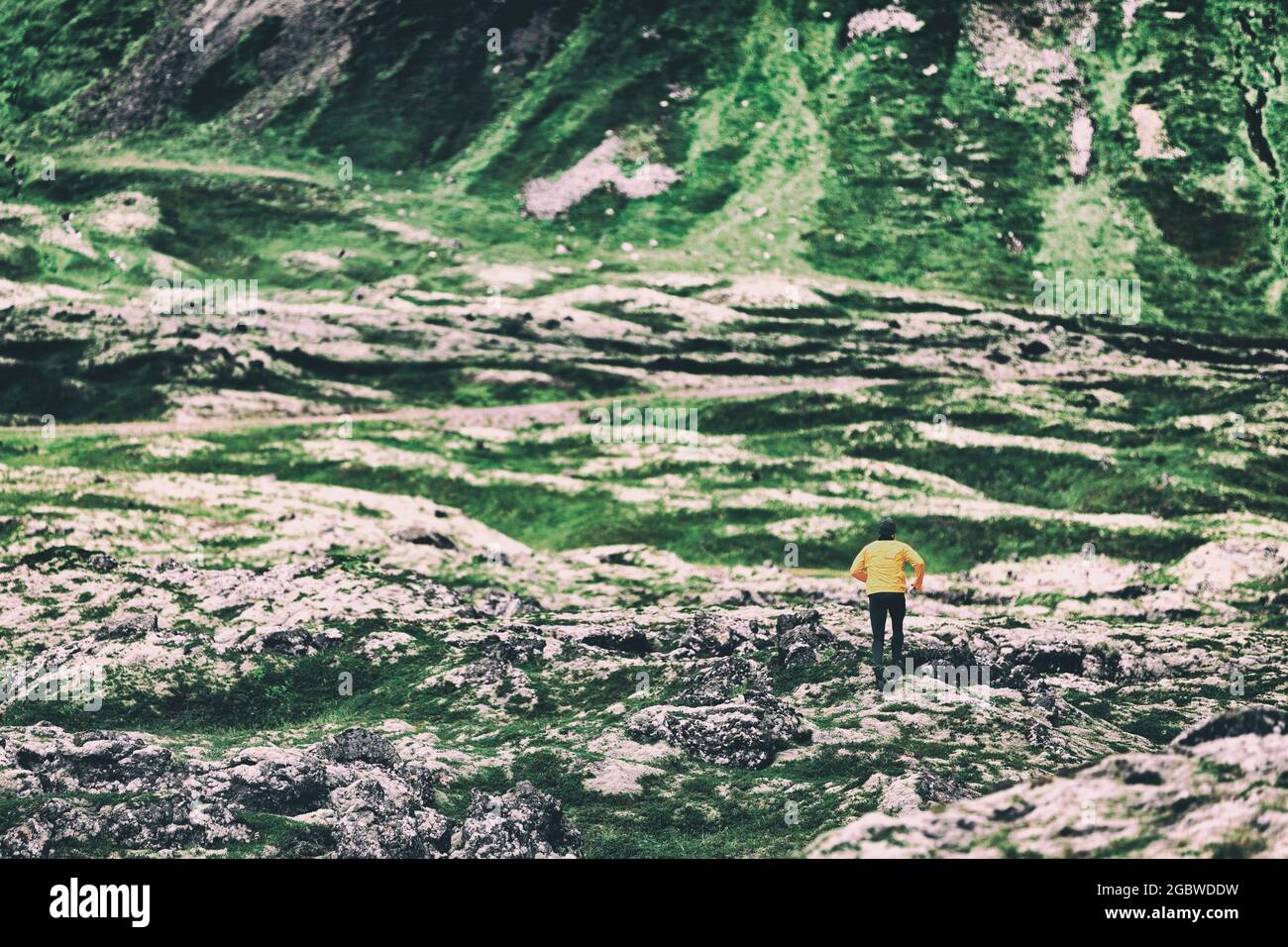 Trail run athlete running on mountain nature background ultra runner on ...