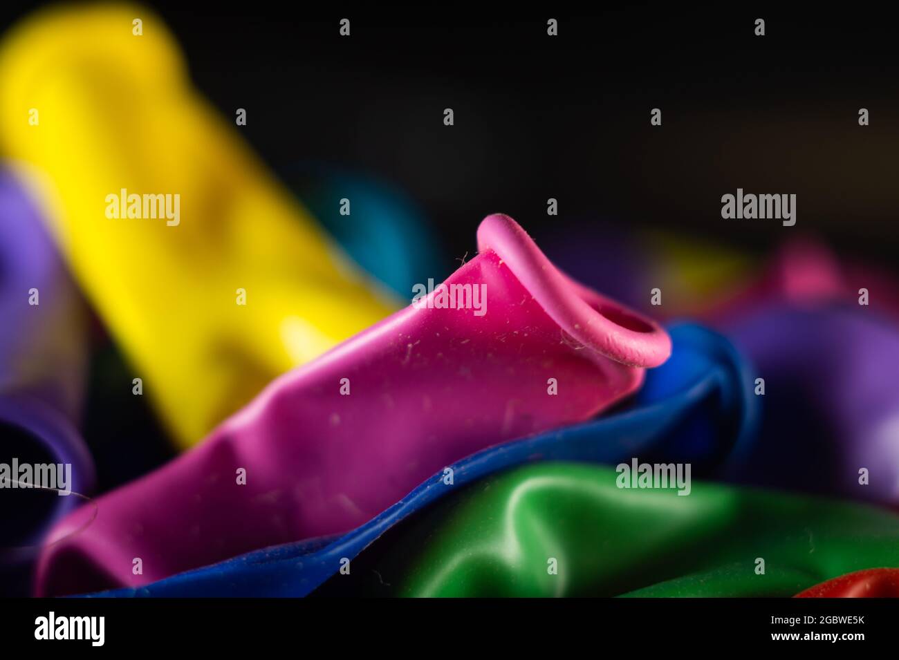 Closeup shot of colorful not blown balloons Stock Photo - Alamy