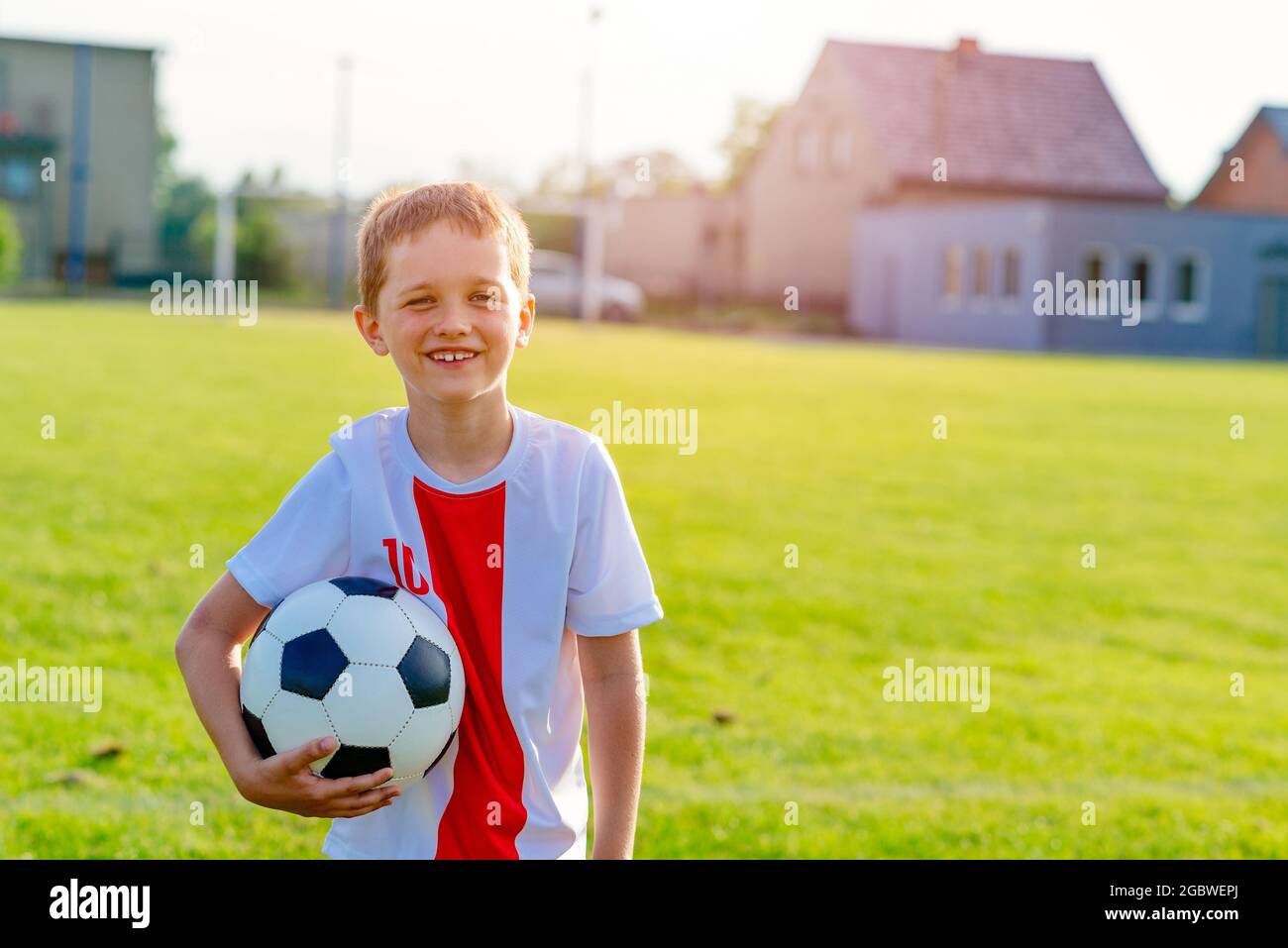 Boy wearing football kit hi-res stock photography and images - Alamy