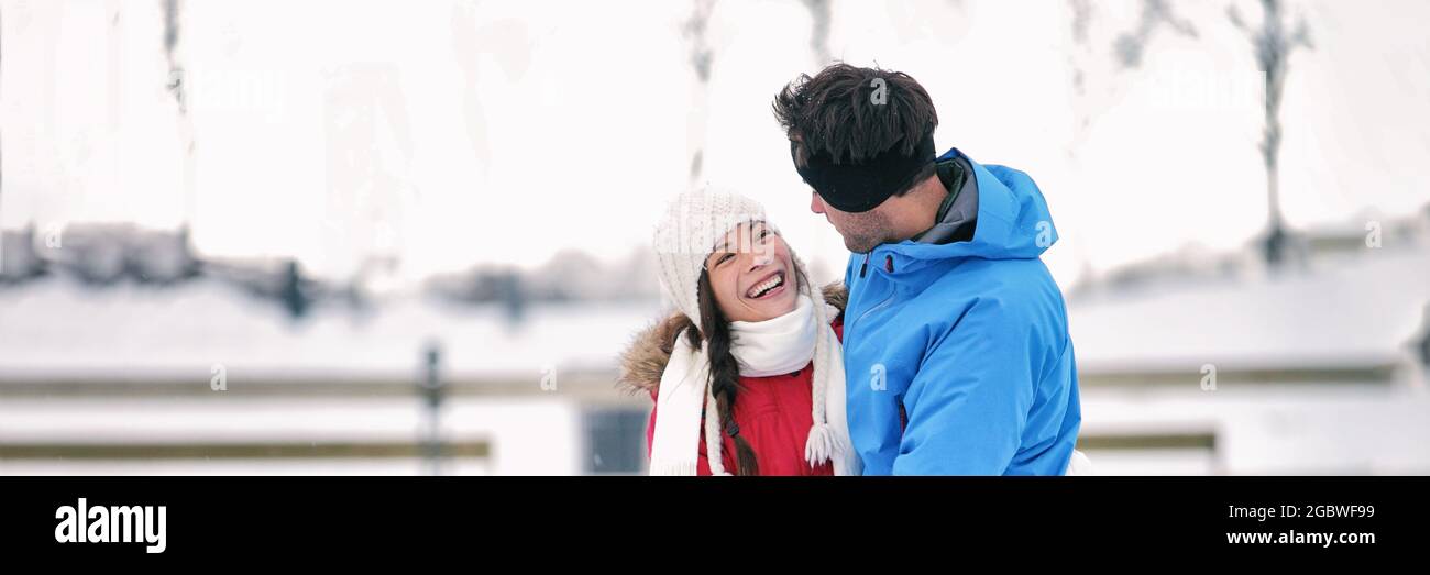 Young couple in love on winter cold outdoor walk outside talking ...