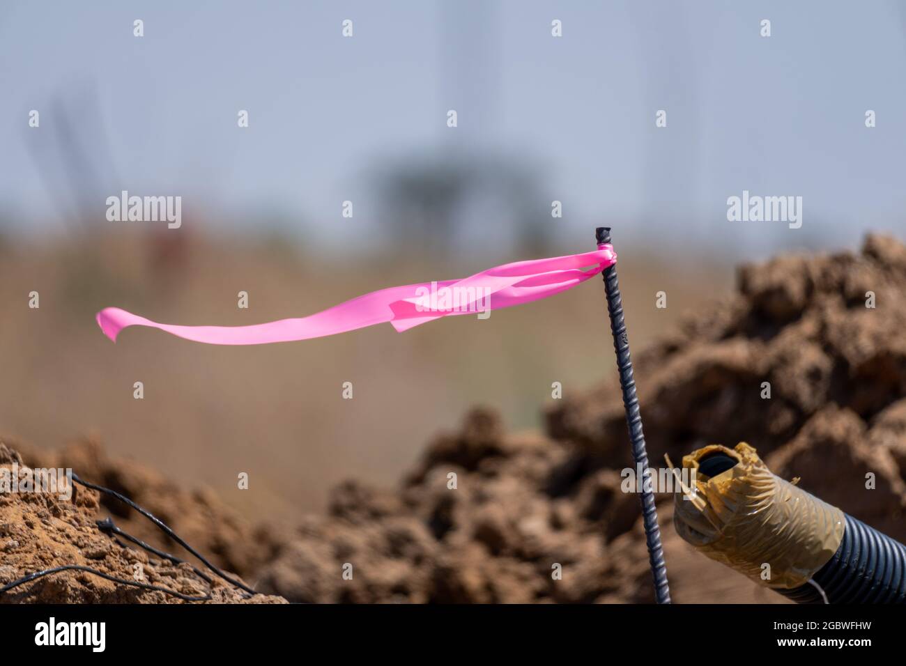 Background with small pink flag at the construction area. Selected ...