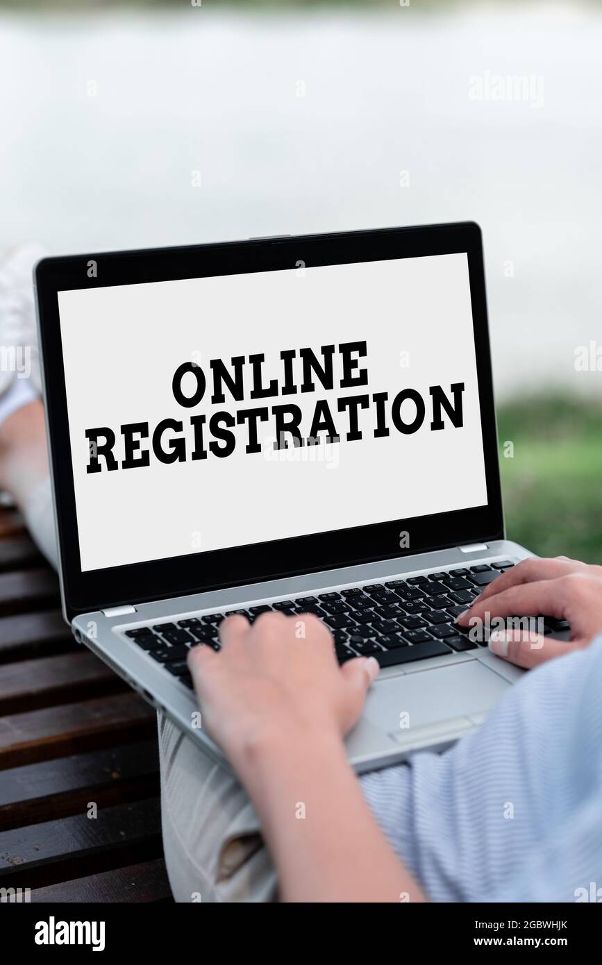Sign displaying Online Registration. Internet Concept registering via ...