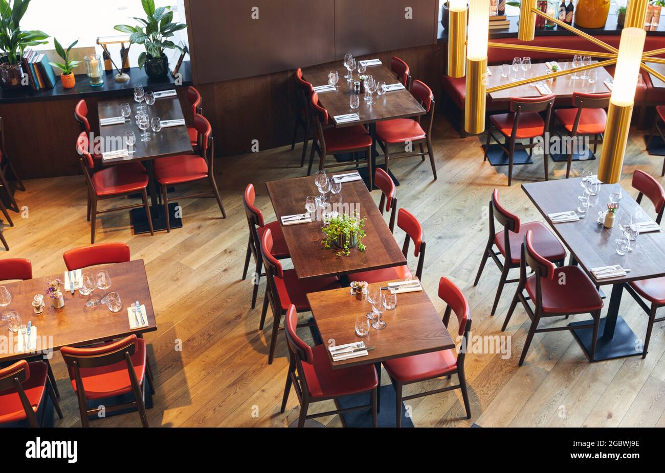 High angle of tables set in restaurant interior Stock Photo - Alamy