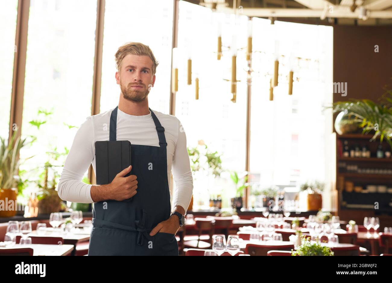 Portrait of restaurant owner Stock Photo - Alamy
