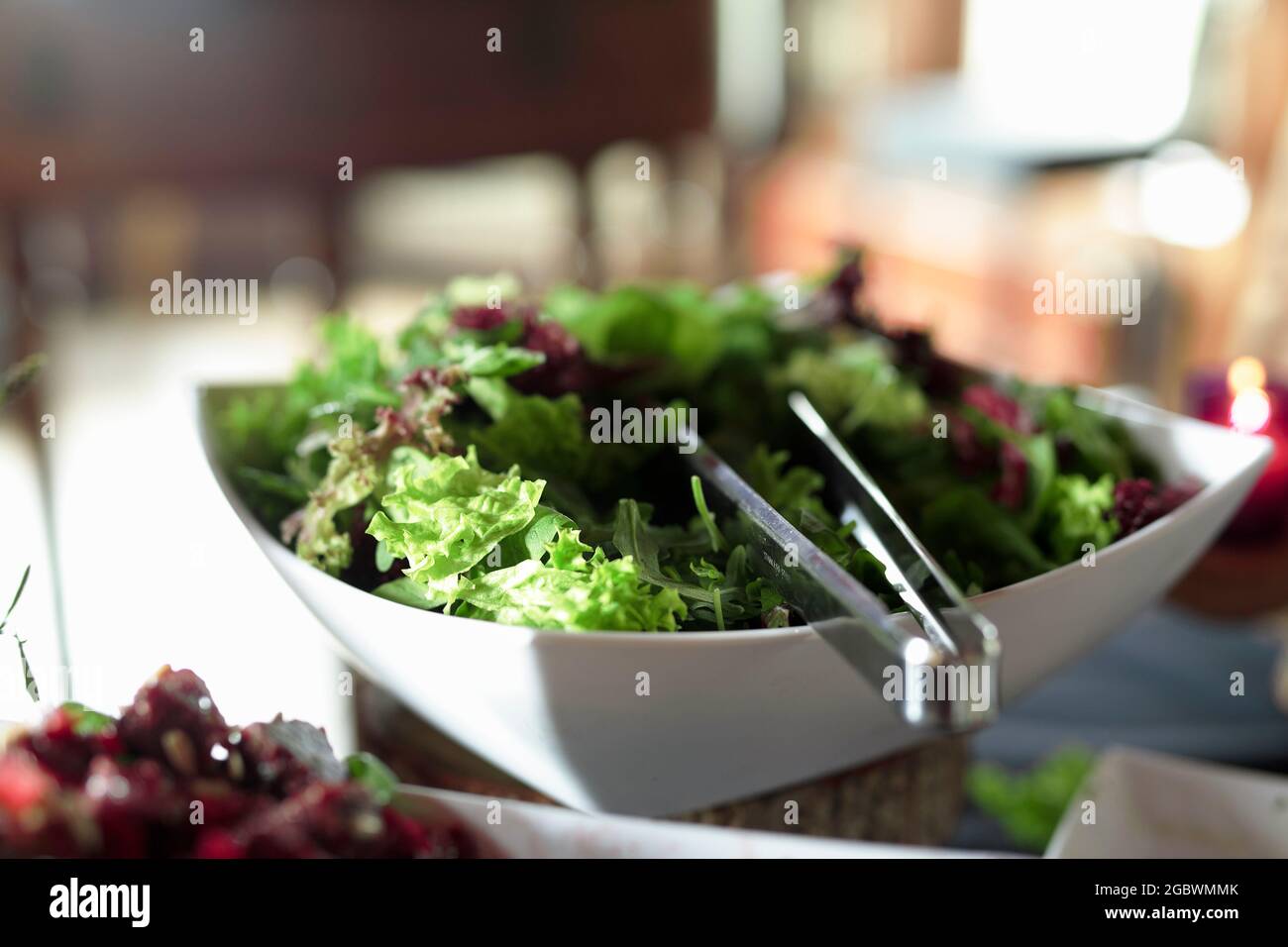 Varied salad with seeds and assorted vegetables. Shot taken in natural ...