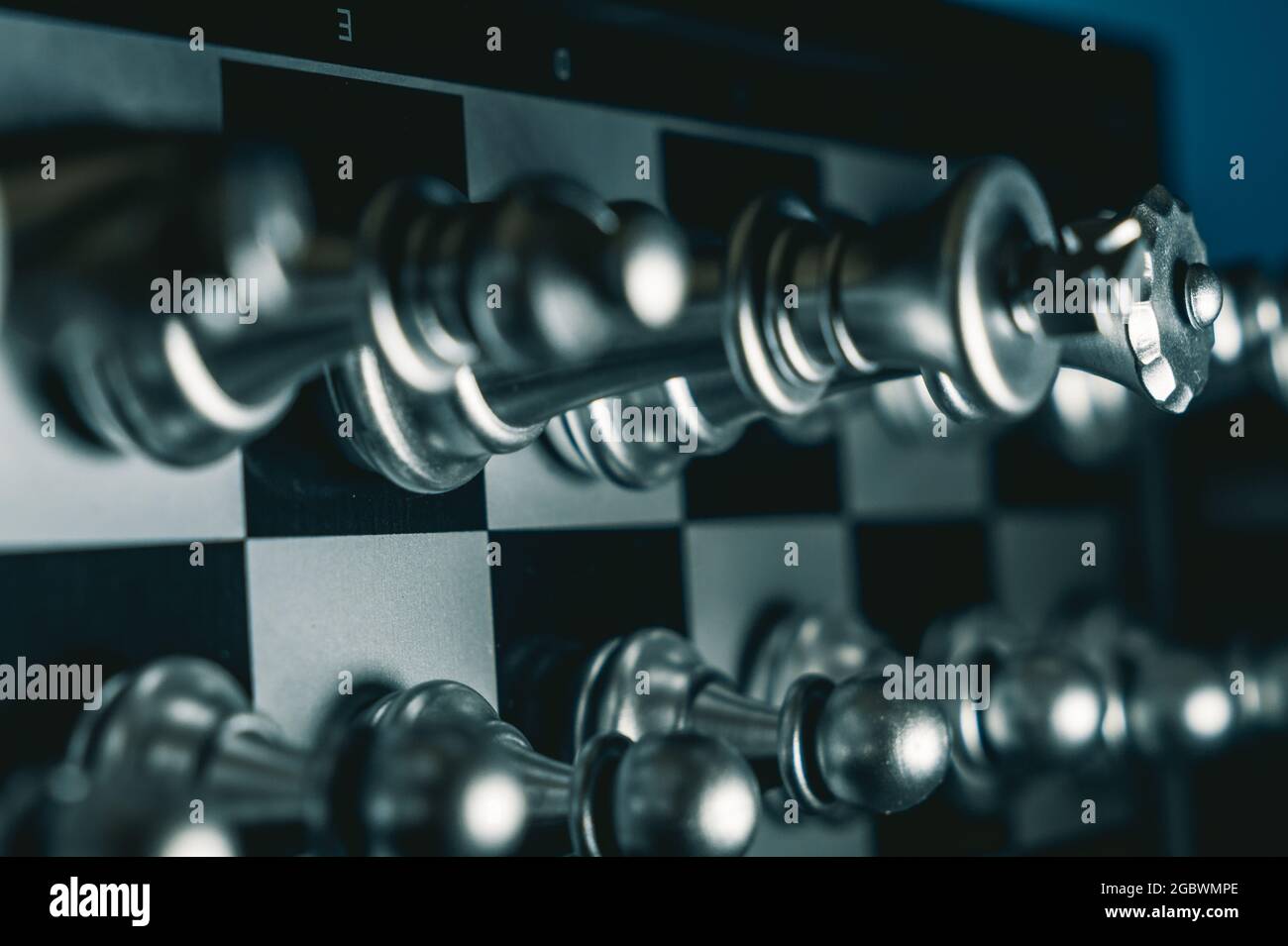 Closeup shot of an arranged chess board with silver pieces Stock Photo ...