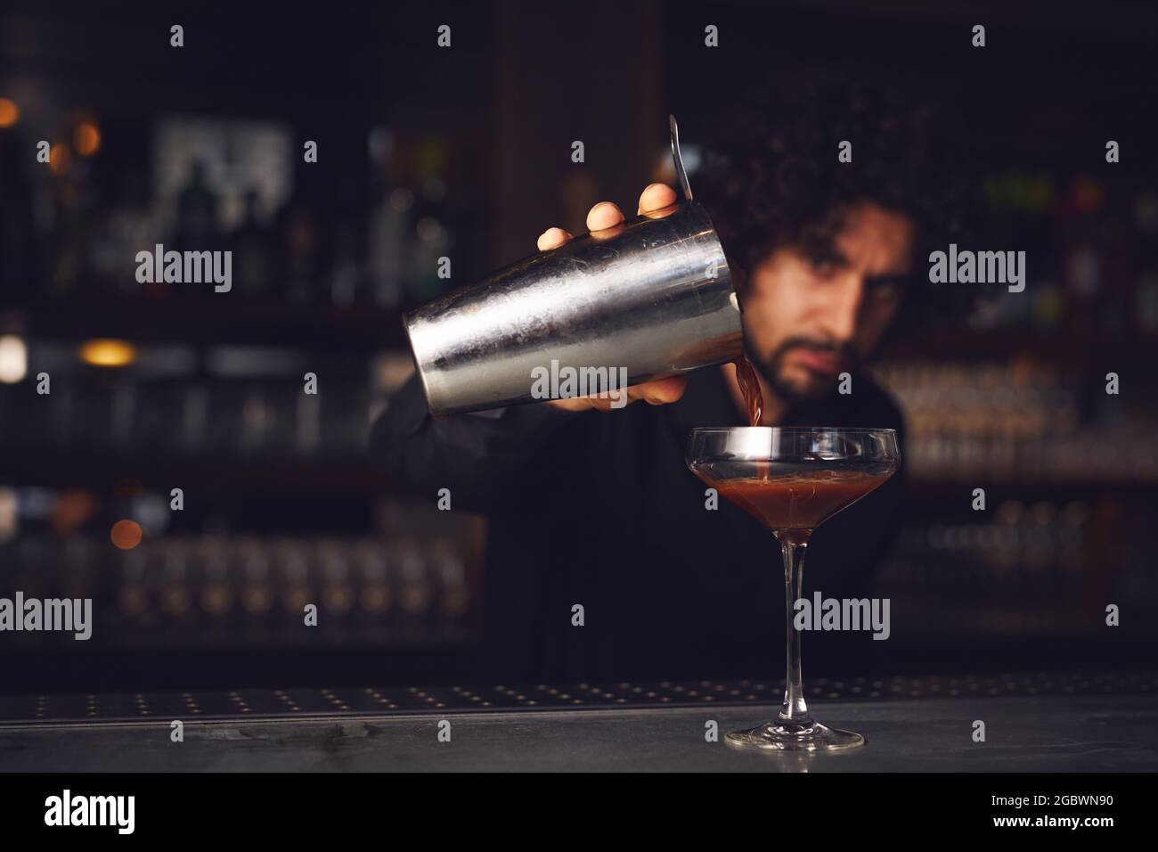 Pouring liquid in shaker glass hi-res stock photography and images - Alamy