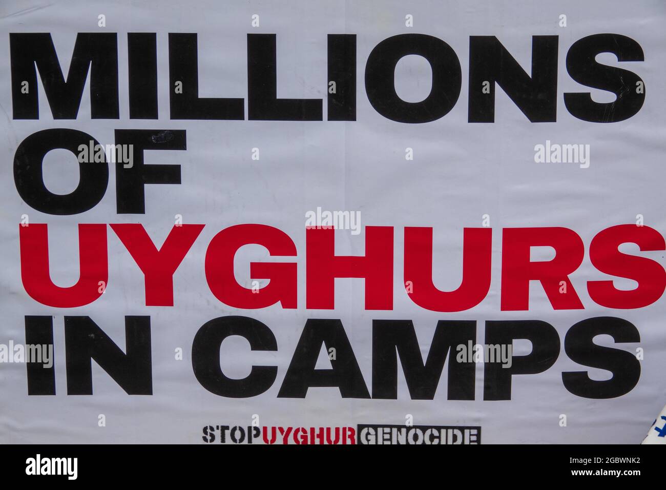 Stop Uyghur Genocide banner protest outside Chinese Embassy. Protesting ...