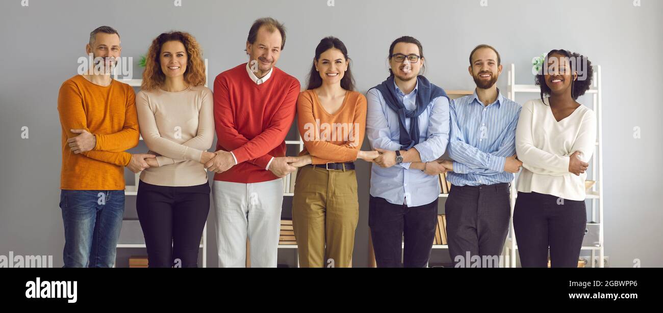 Group of happy smiling diverse people standing in row all together and ...