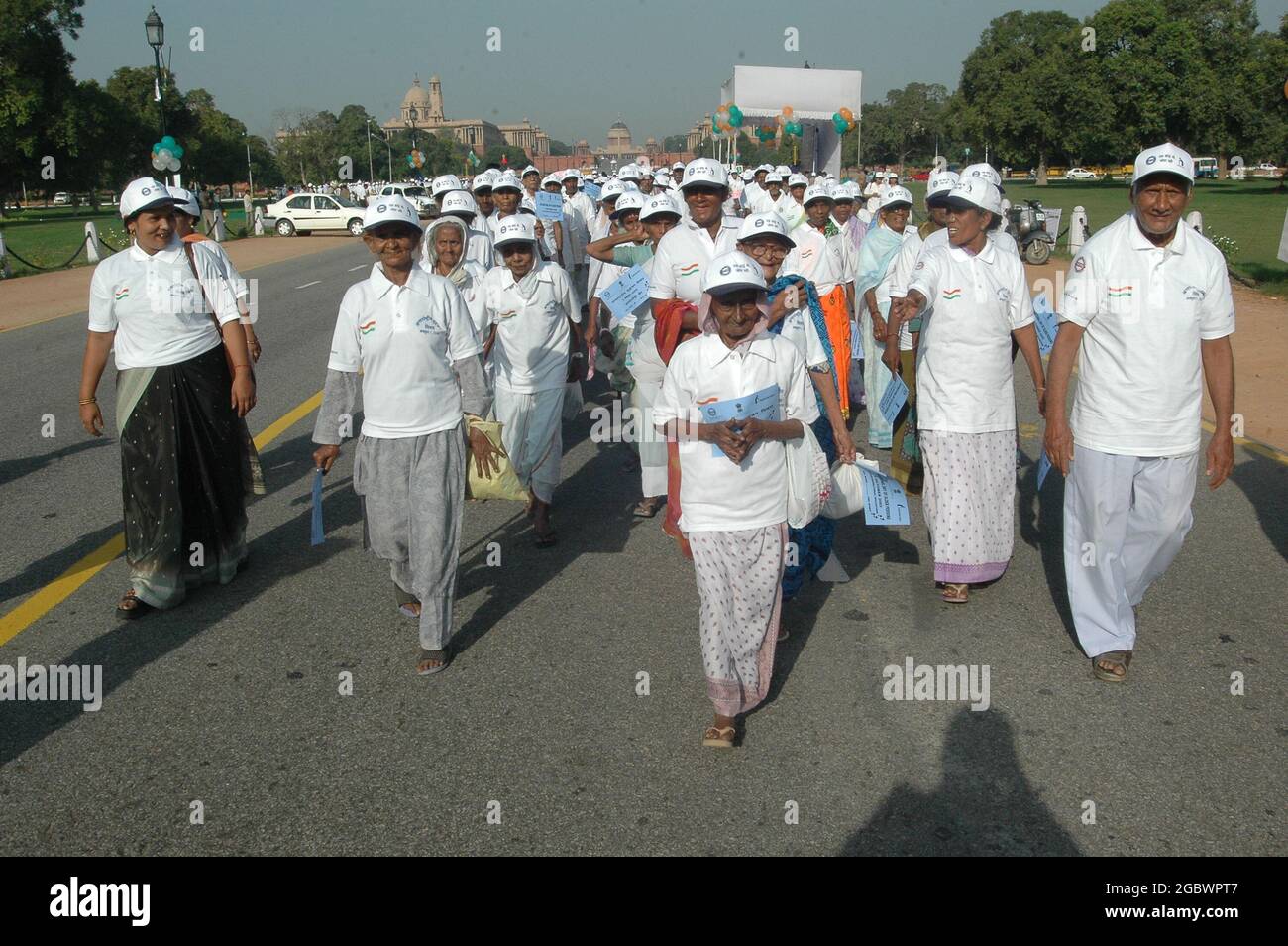 Participants across generation participate in a walkathon to mark ...