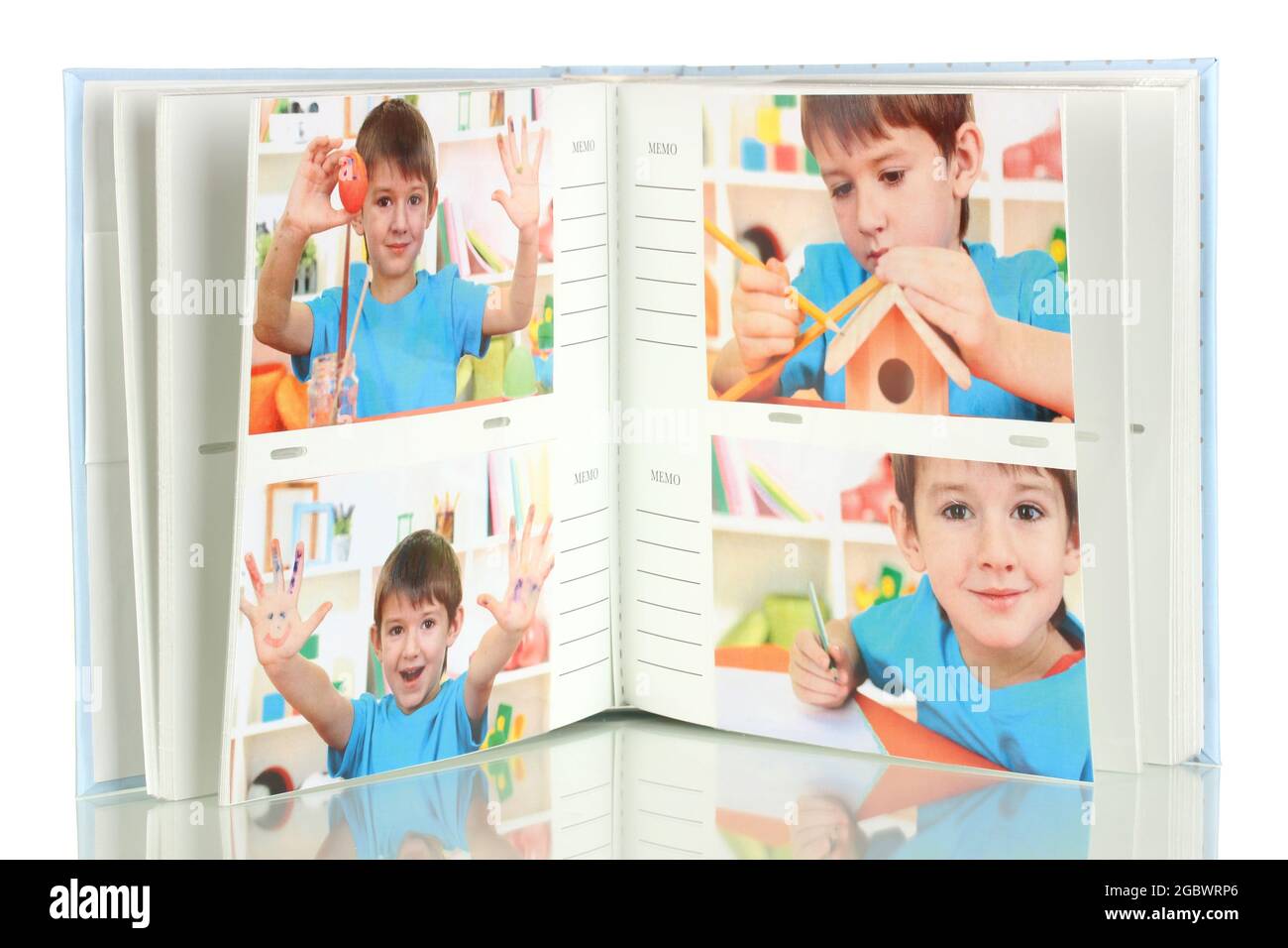 Open photo album isolated on white Stock Photo - Alamy