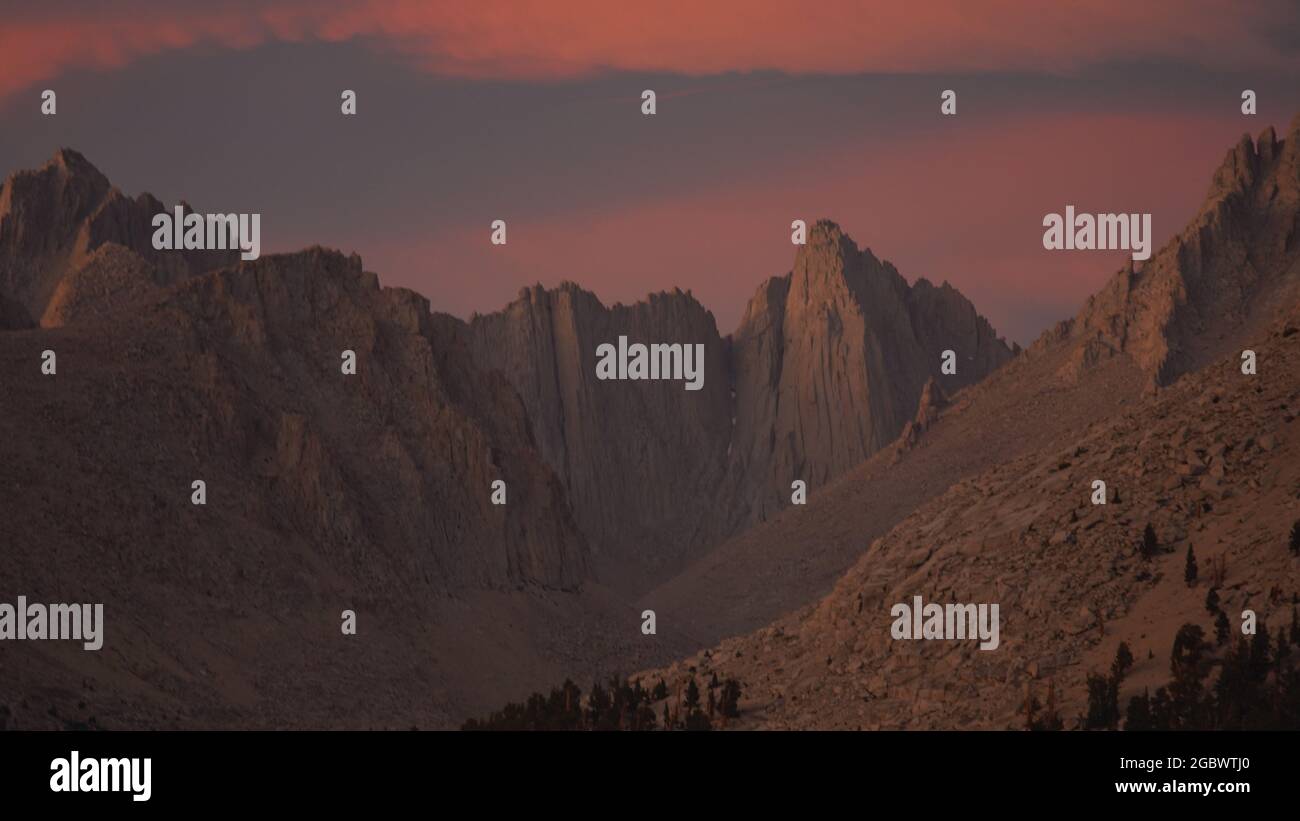 Sunset with dramatic clouds over Mount Whitney on the Pacific Crest ...
