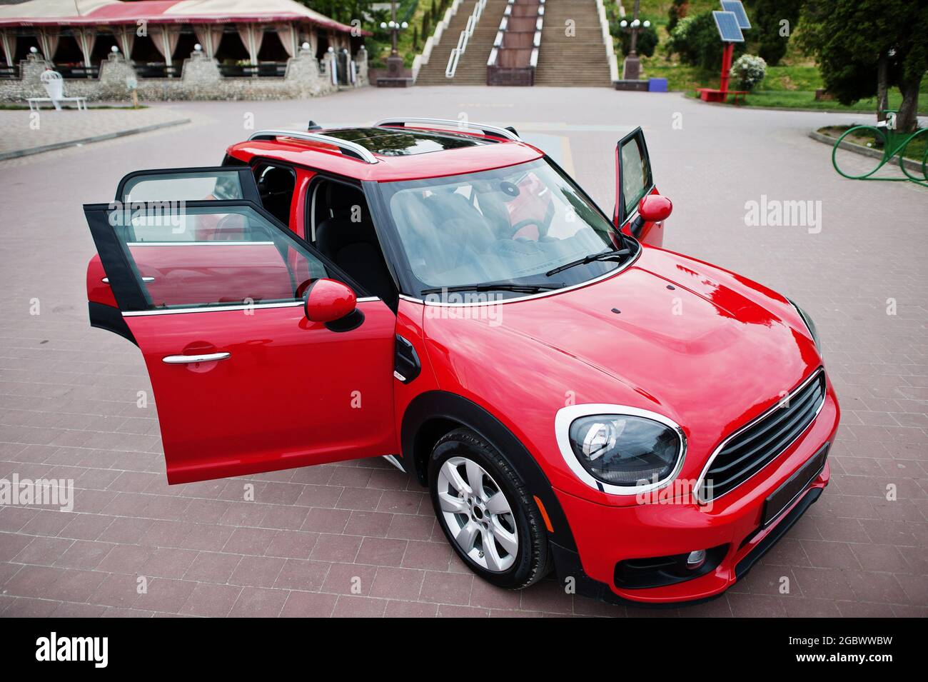 Red city car. Small car for cities Stock Photo - Alamy
