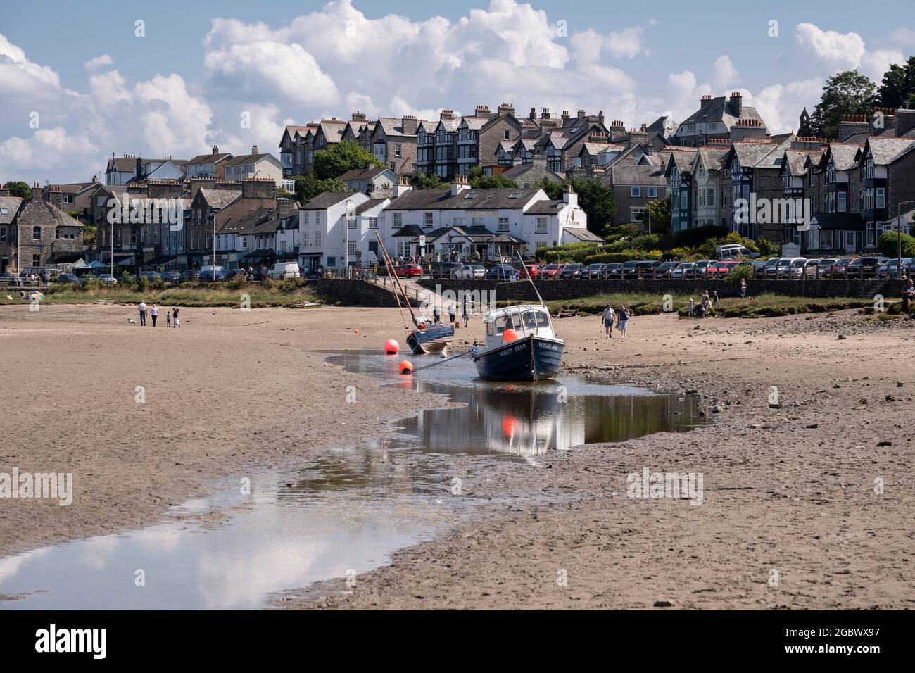 Low tide at Arnside in Lancashire, England with fishing boats high and ...