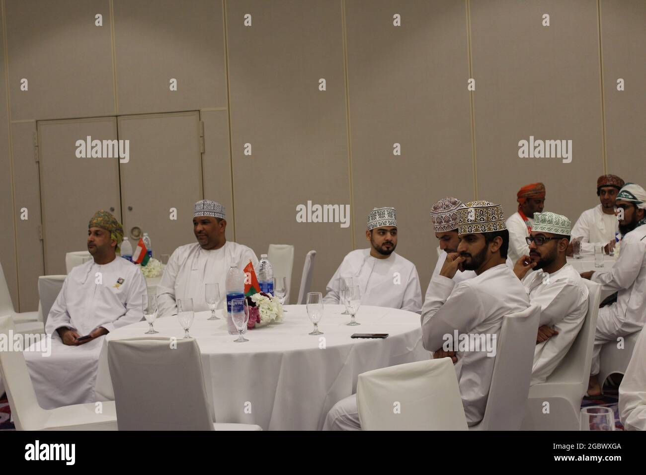 Omani Citizens or employees are sitting in Circular table and ...