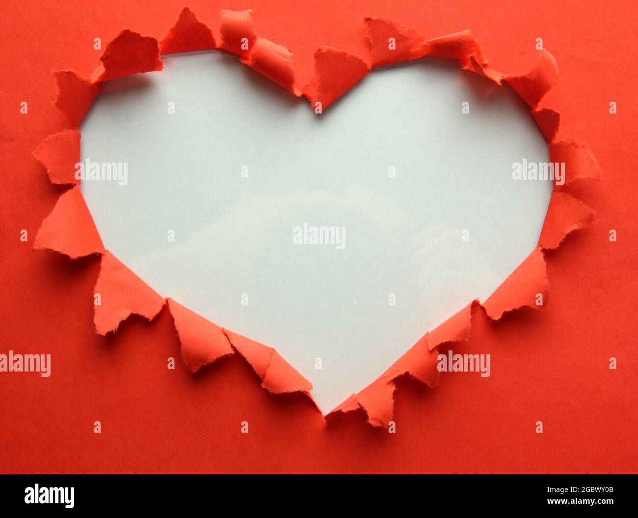 Beautiful torn paper in heart shape symbol Stock Photo - Alamy