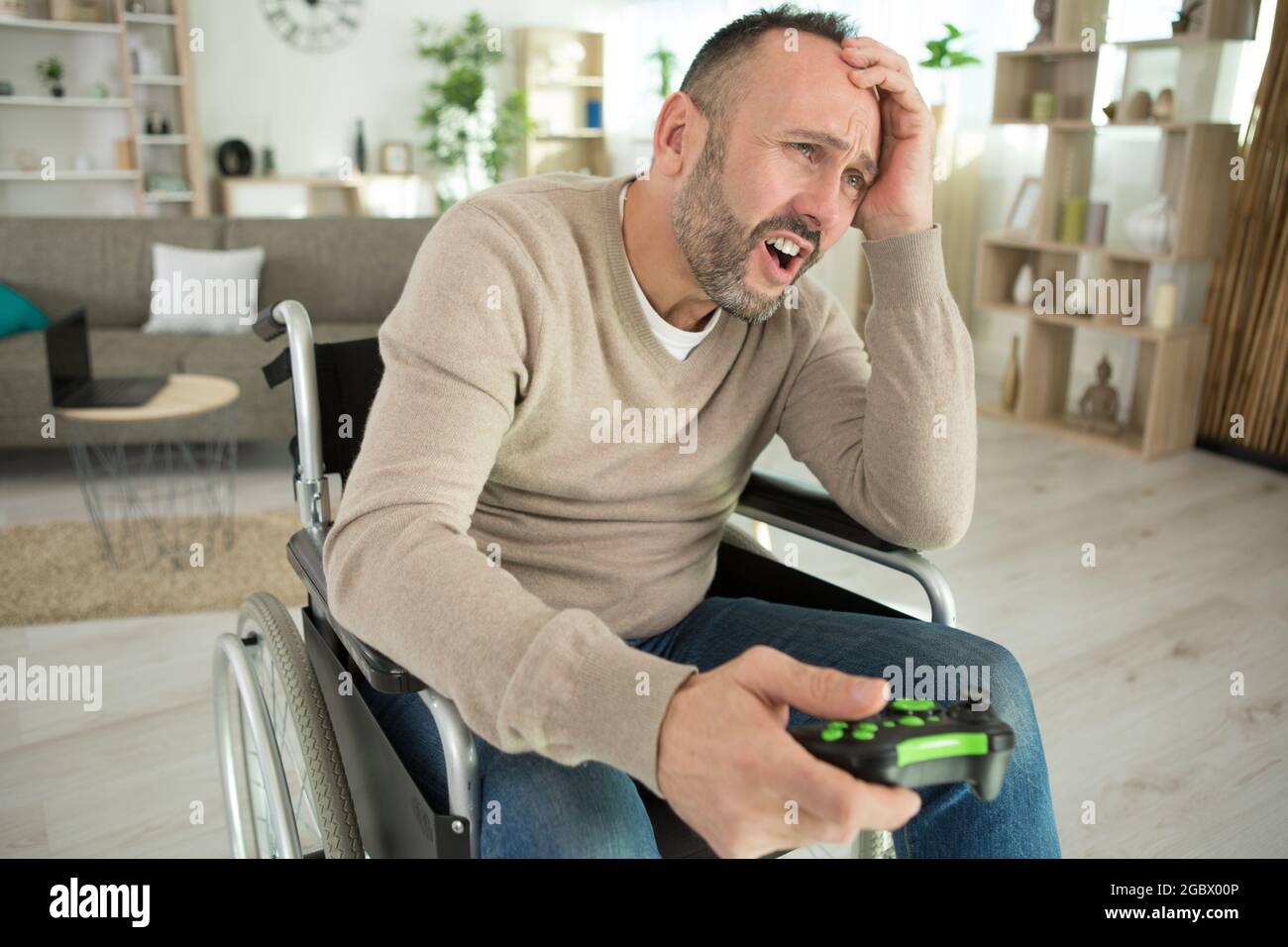 Playing computer game in wheelchair hi-res stock photography and images ... Playing computer game in wheelchair hi-res stock photography and images ...