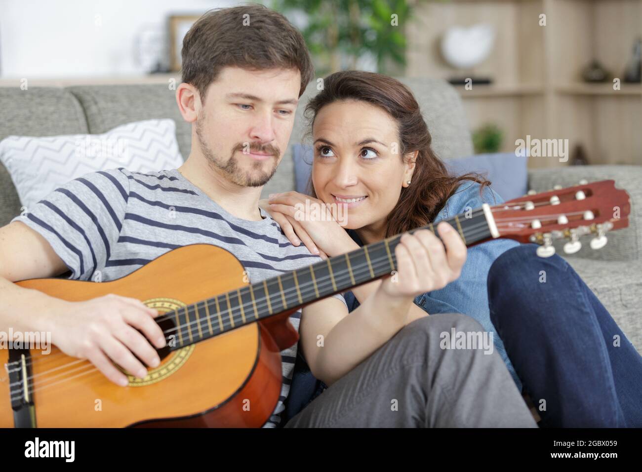 Handsome rock guitarist practicing hi-res stock photography and images ...