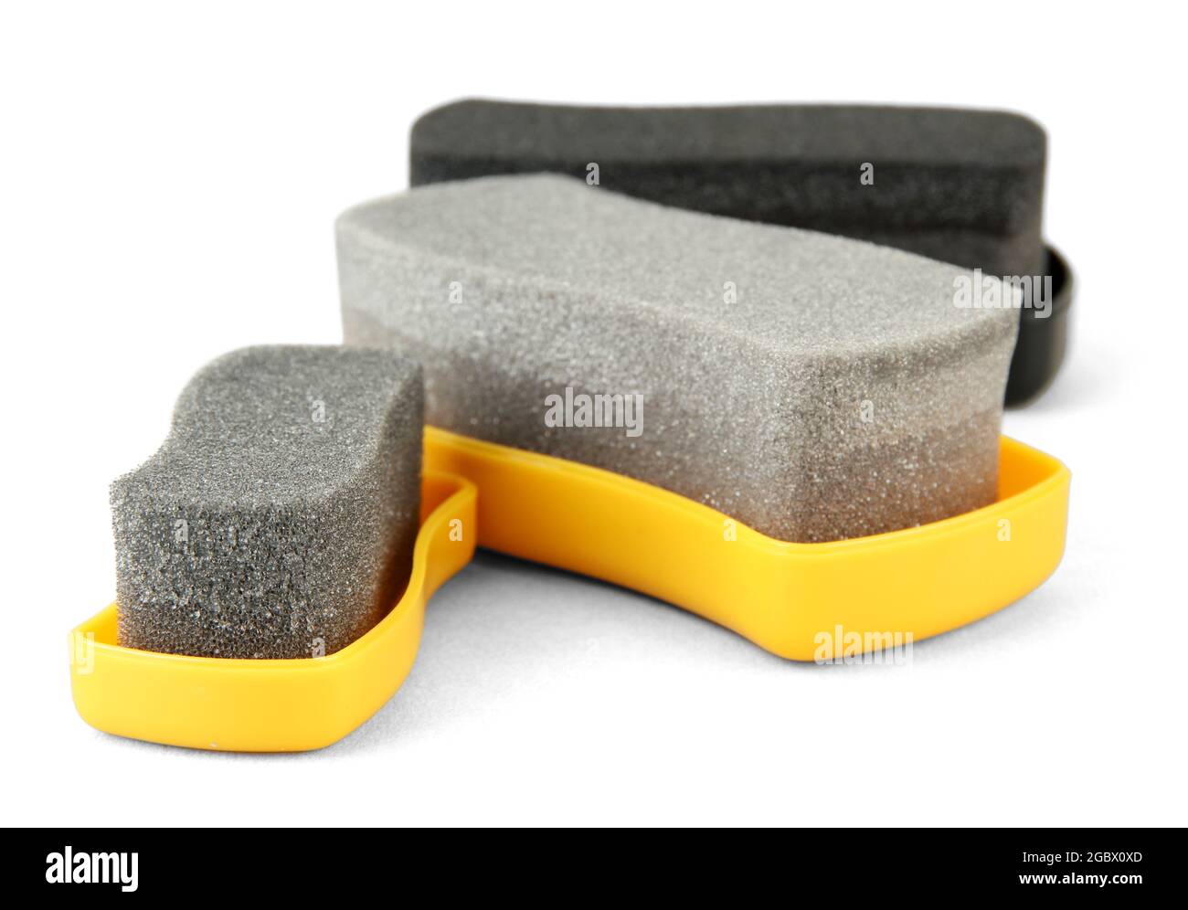 Shoe shine sponges, on color background Stock Photo - Alamy