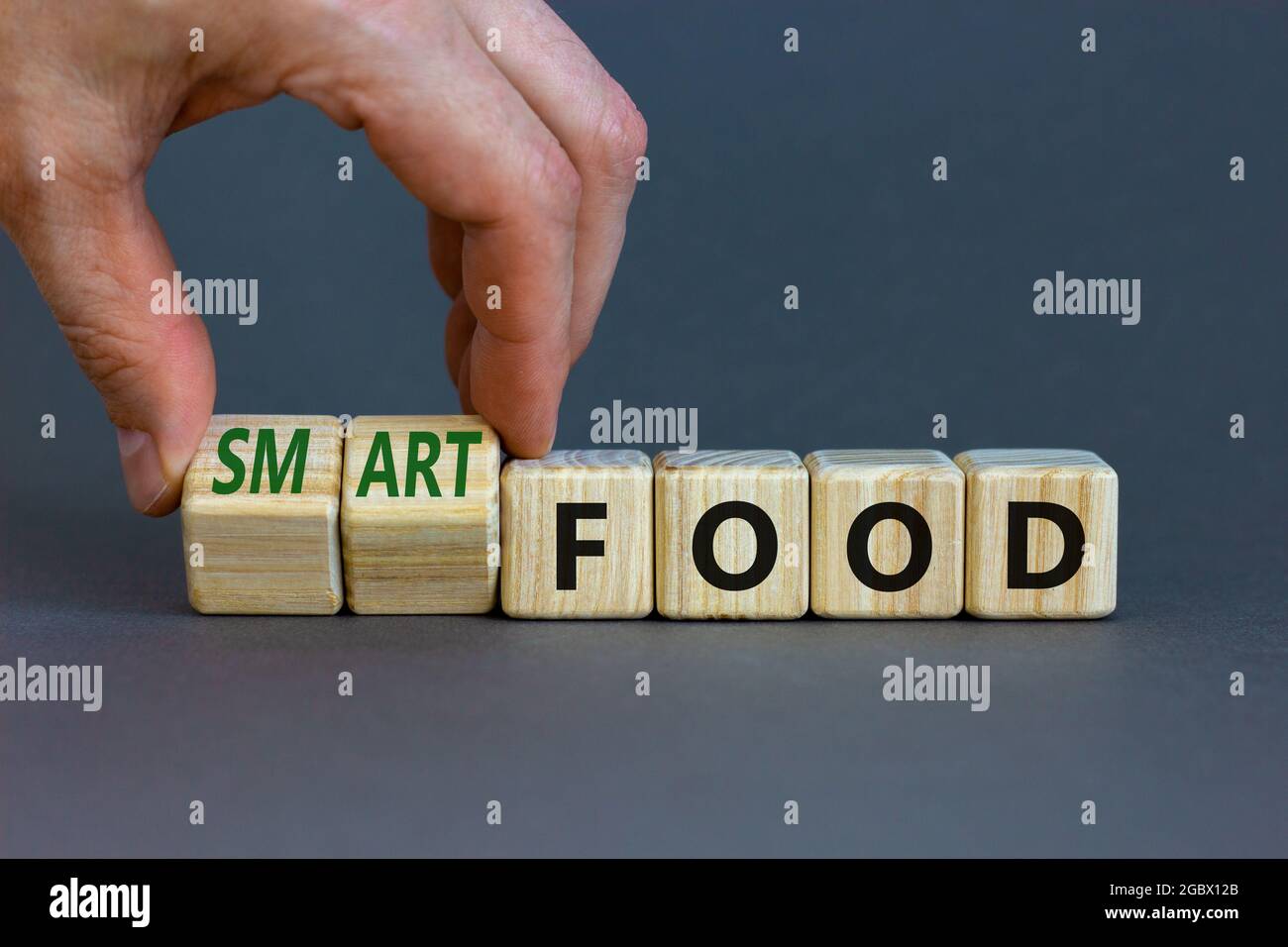 Smart food symbol. Doctor turns cubes and changes words 'food' to ...