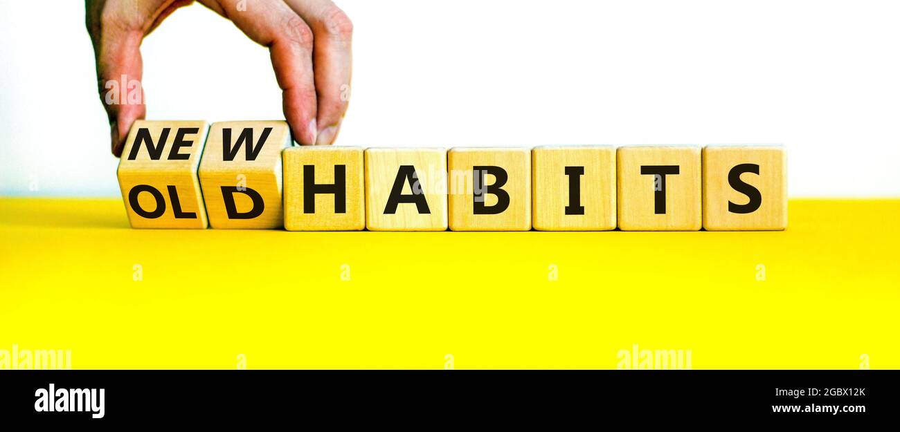 New or old habits symbol. Businessman turns wooden cubes and changes ...