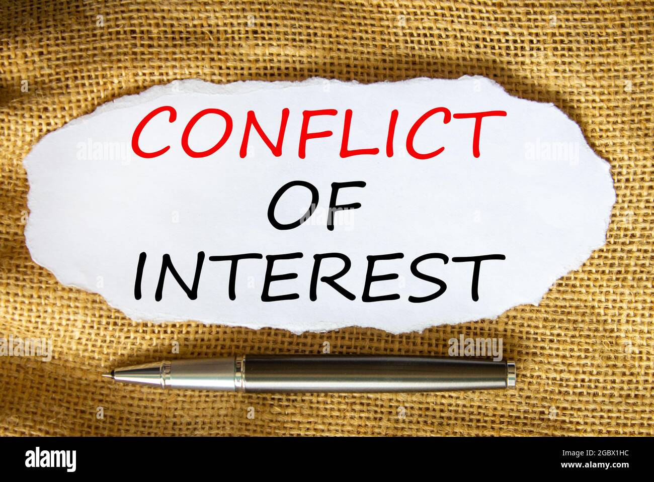 Conflict of interest symbol. Words 'Conflict of interest' on white ...