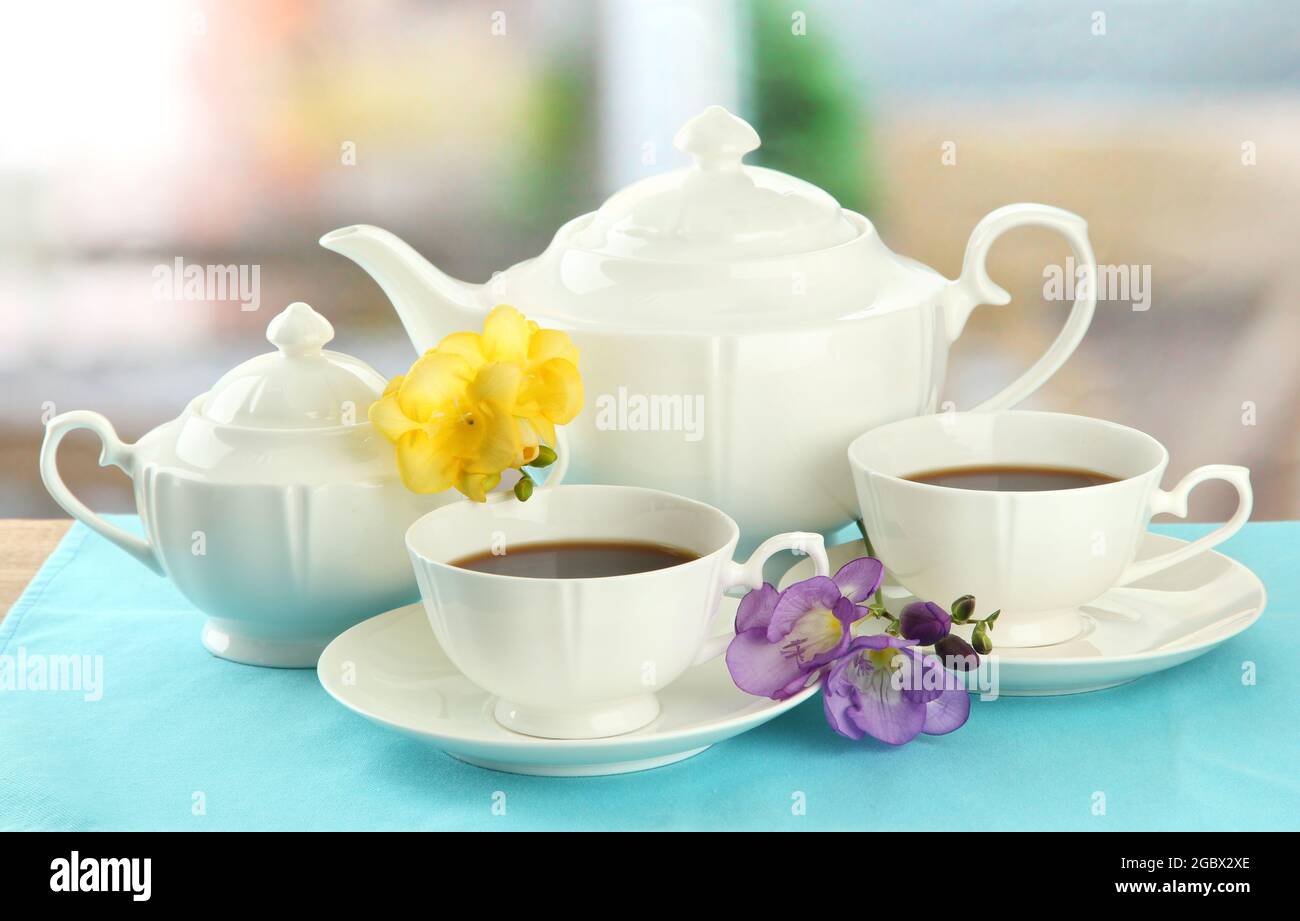 Beautiful tea service on table Stock Photo - Alamy