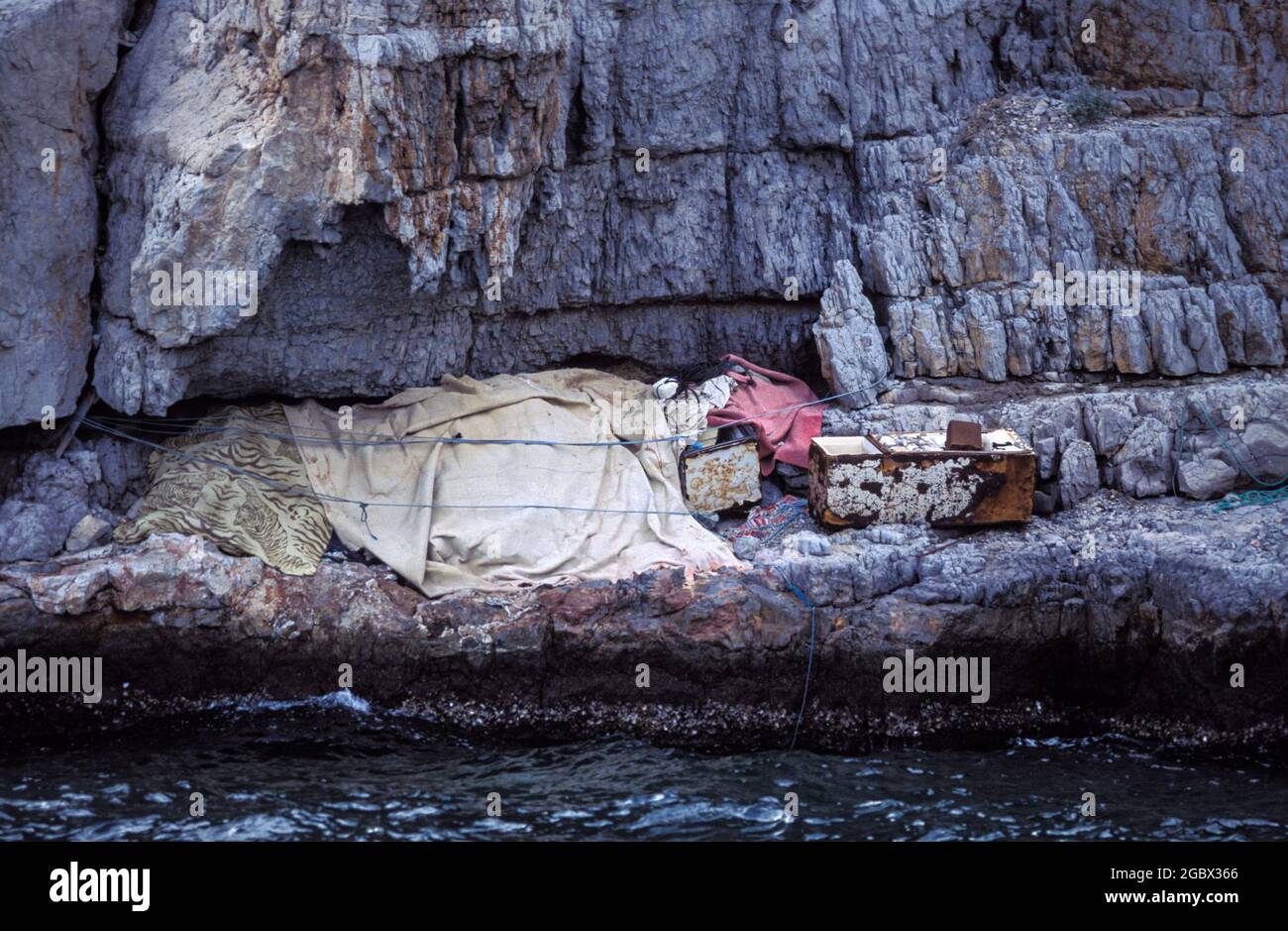 Boxes in safe place in rocks, Musandam Peninsula, Oman Stock Photo - Alamy