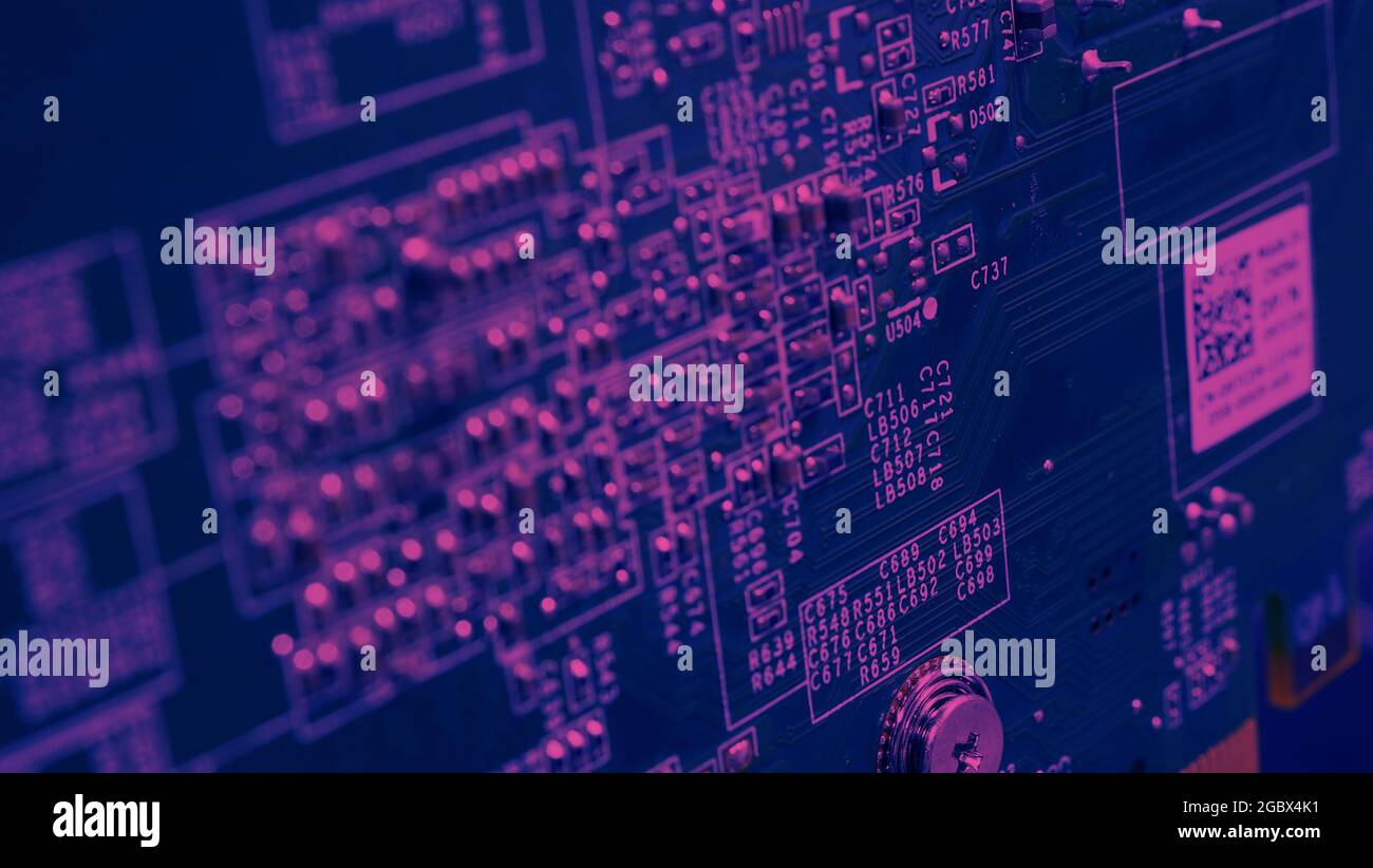 Semiconductor. cpu chip located on the green motherboard of the ...