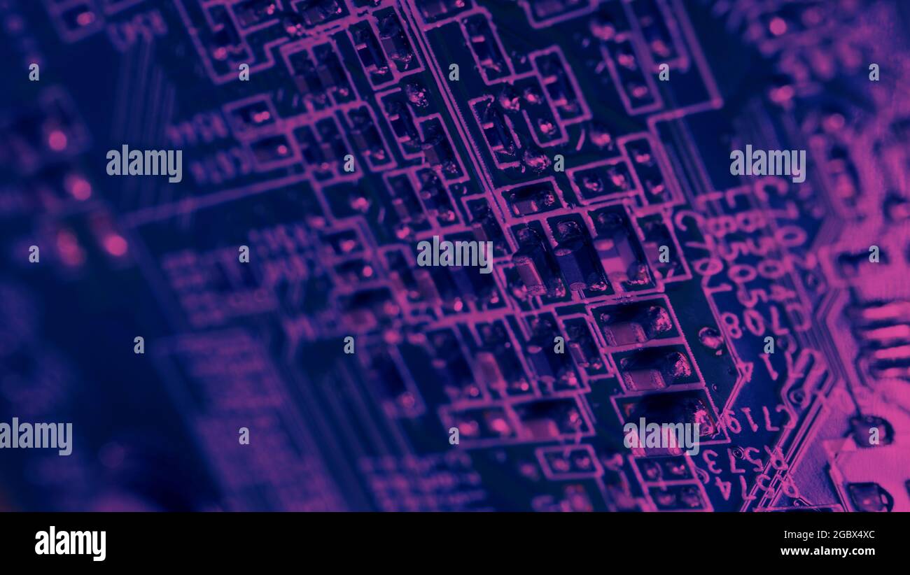 Semiconductor. cpu chip located on the green motherboard of the ...