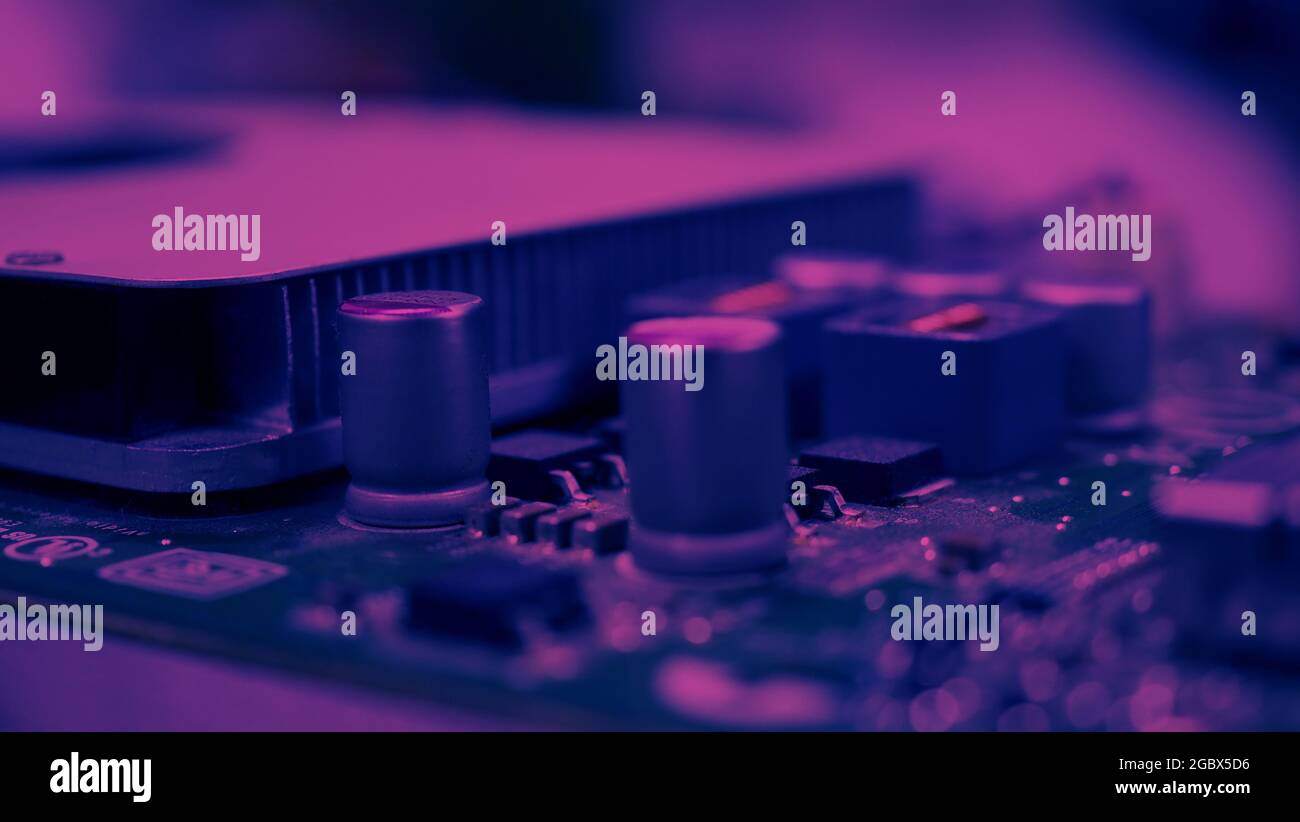 Semiconductor. cpu chip located on the green motherboard of the ...