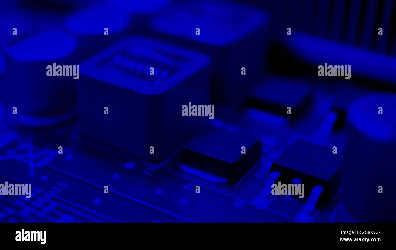 Semiconductor. cpu chip located on the green motherboard of the ...
