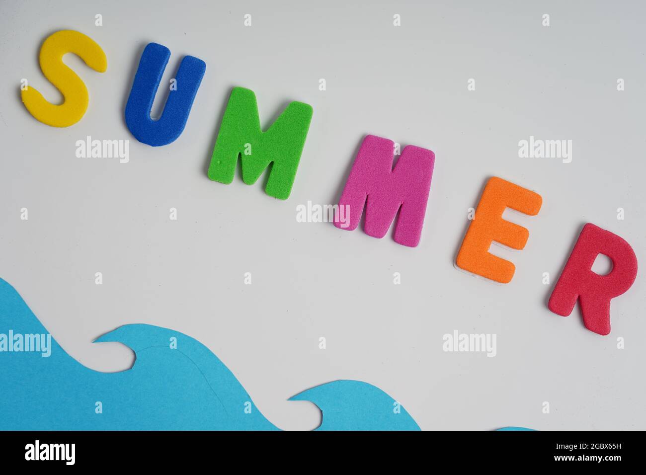 Word summer written in colored alphabets o a white background ,concept ...