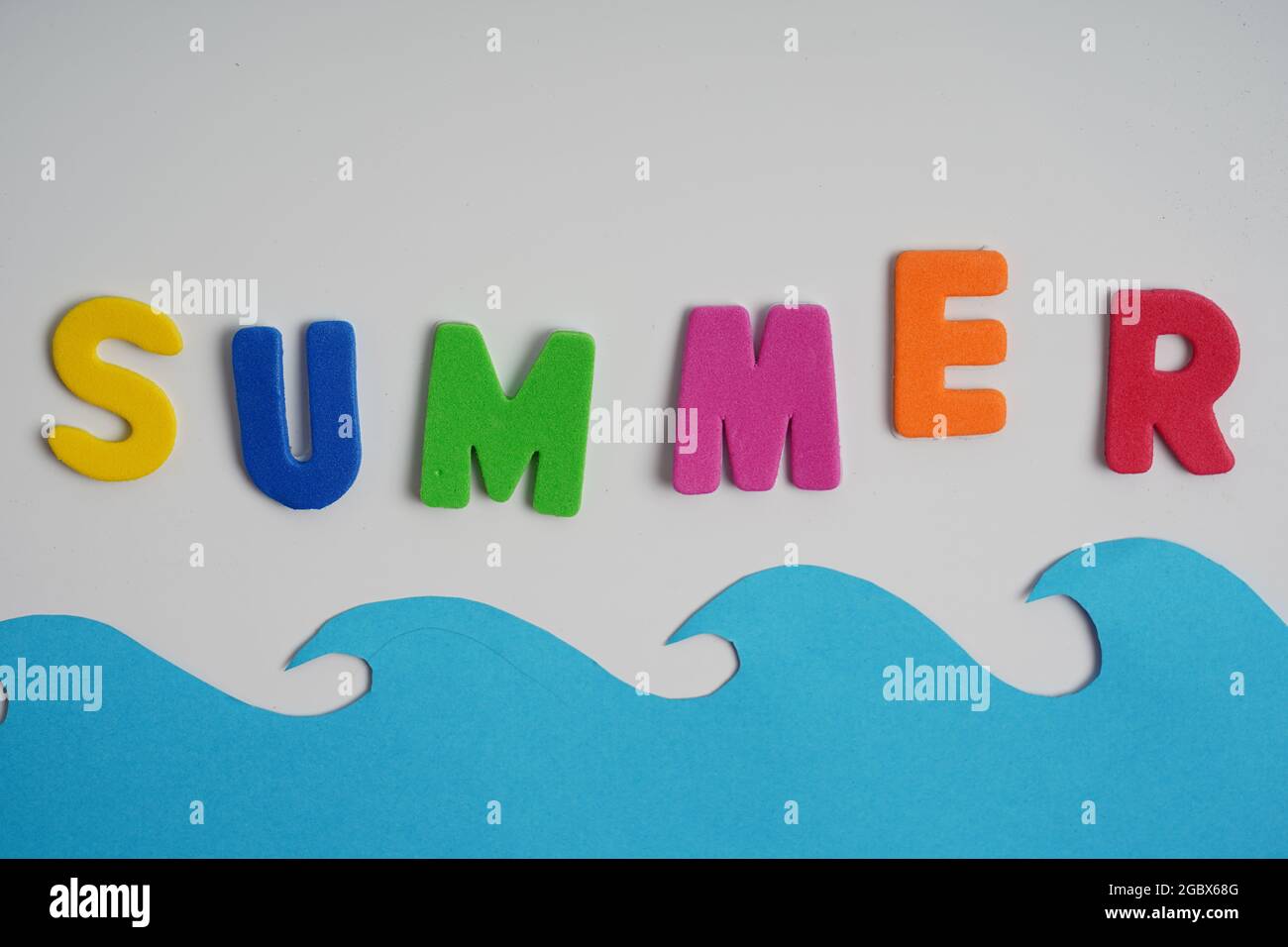 Word summer written in colored alphabets o a white background ,concept ...