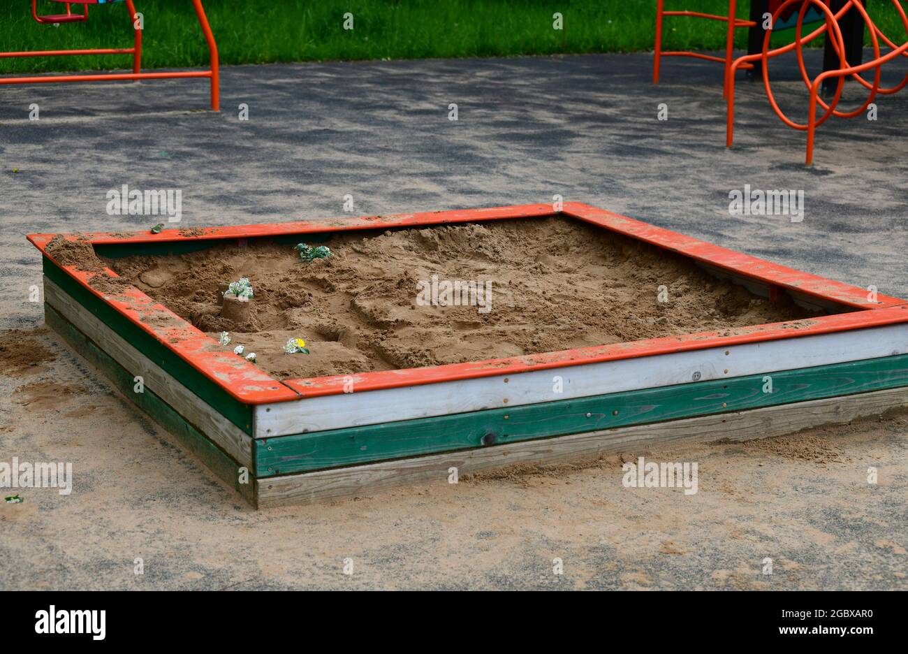 Empty Children's sandbox with a crafts and flowers, Russia Stock Photo ...