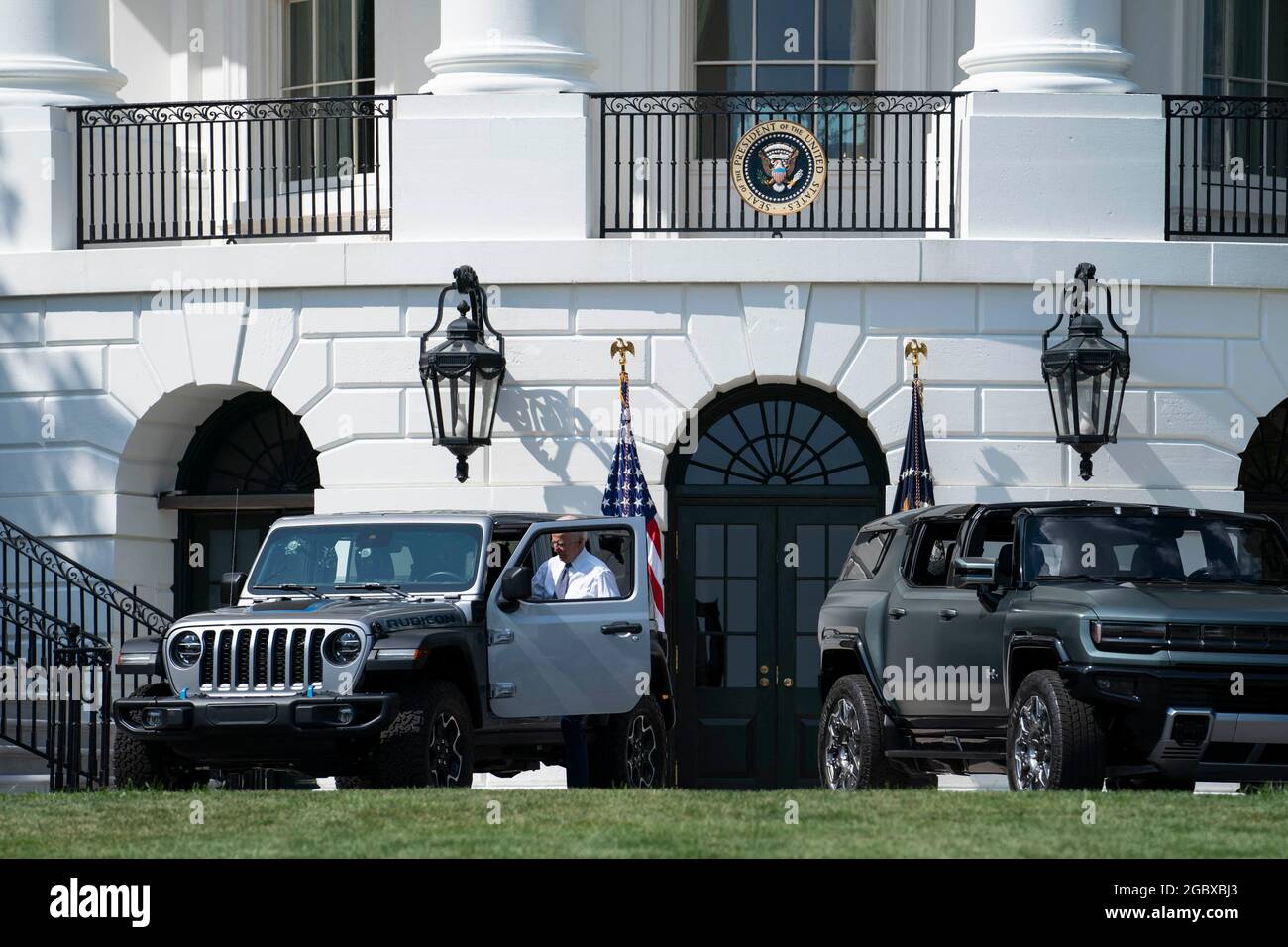 President Joe Biden boards a Jeep Wrangler Unlimited 4xe Rubicon before ...