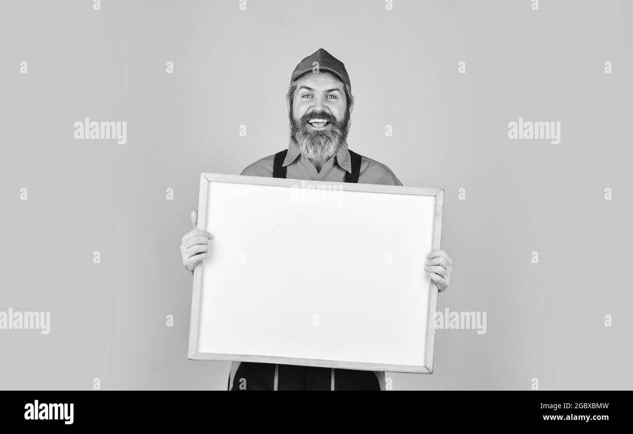 man with presentation. Builder points to flipchart. Architect Worker ...