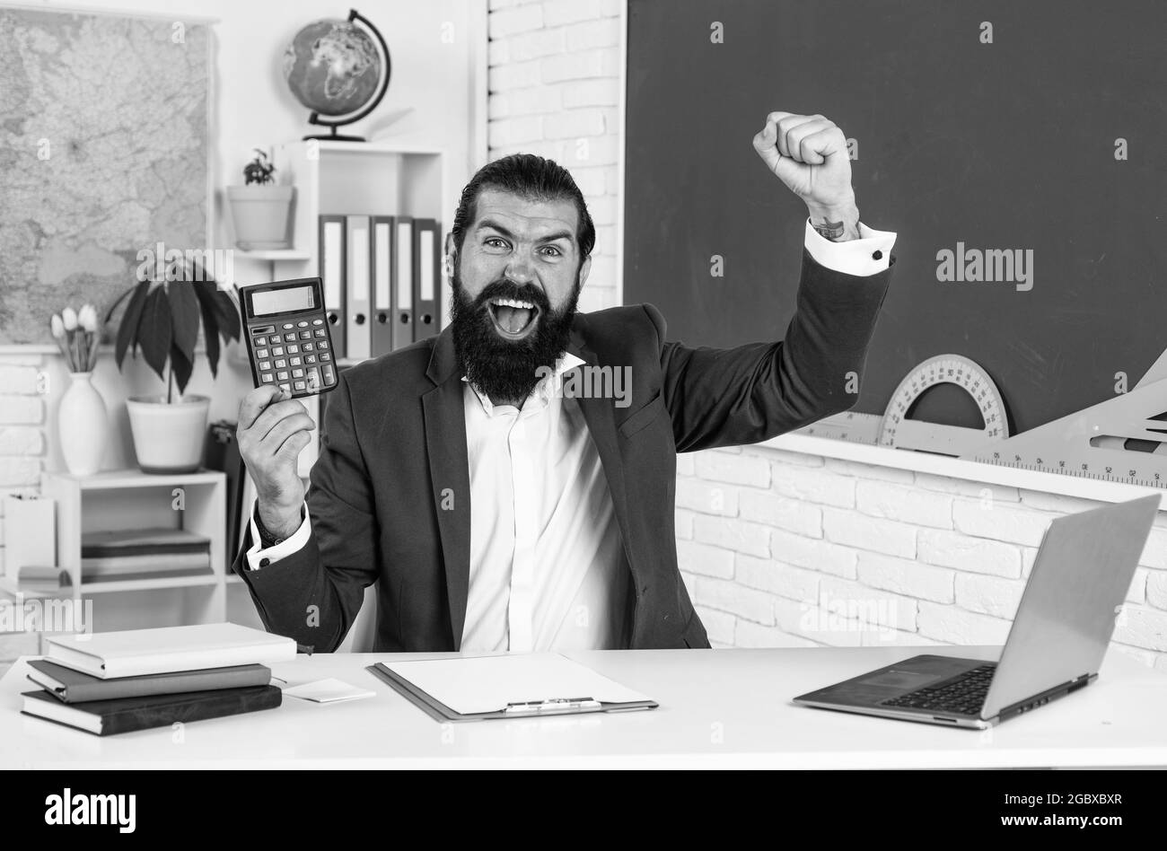 Class teacher student sit Black and White Stock Photos & Images - Alamy