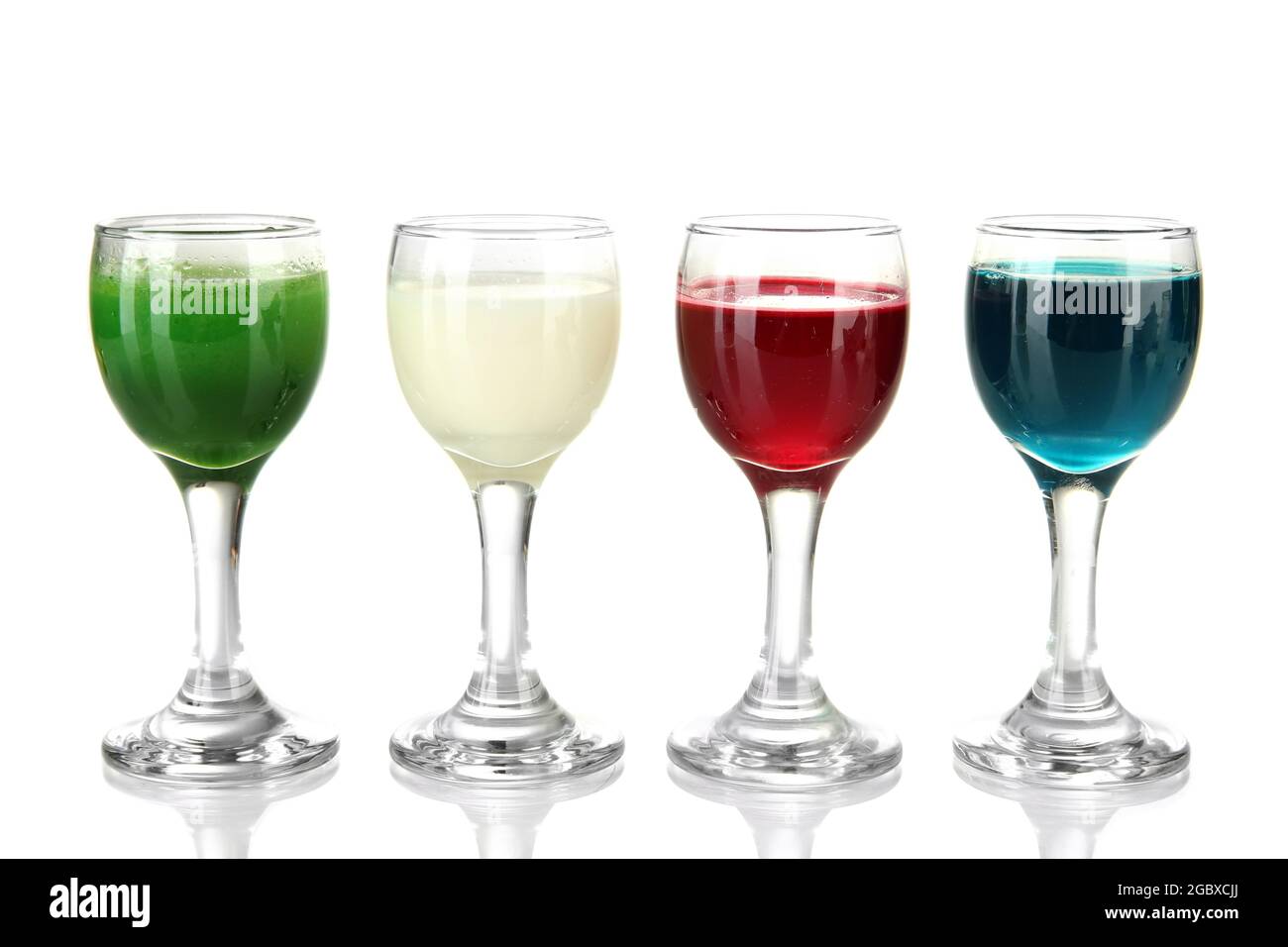 Tasty color liquors, isolated on white Stock Photo - Alamy