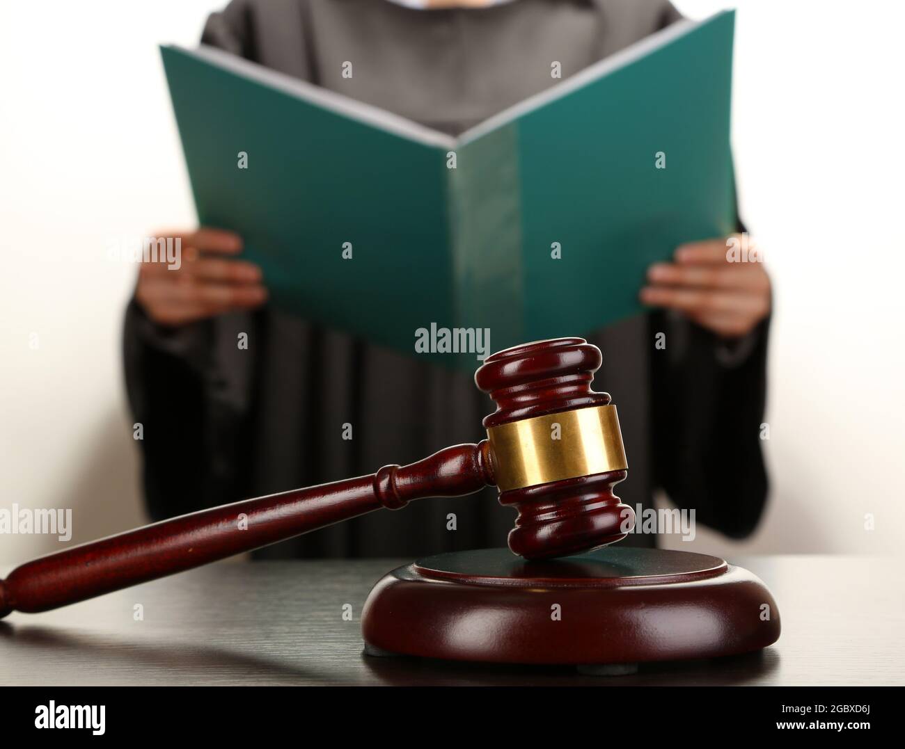 Judge read verdict on white background Stock Photo - Alamy