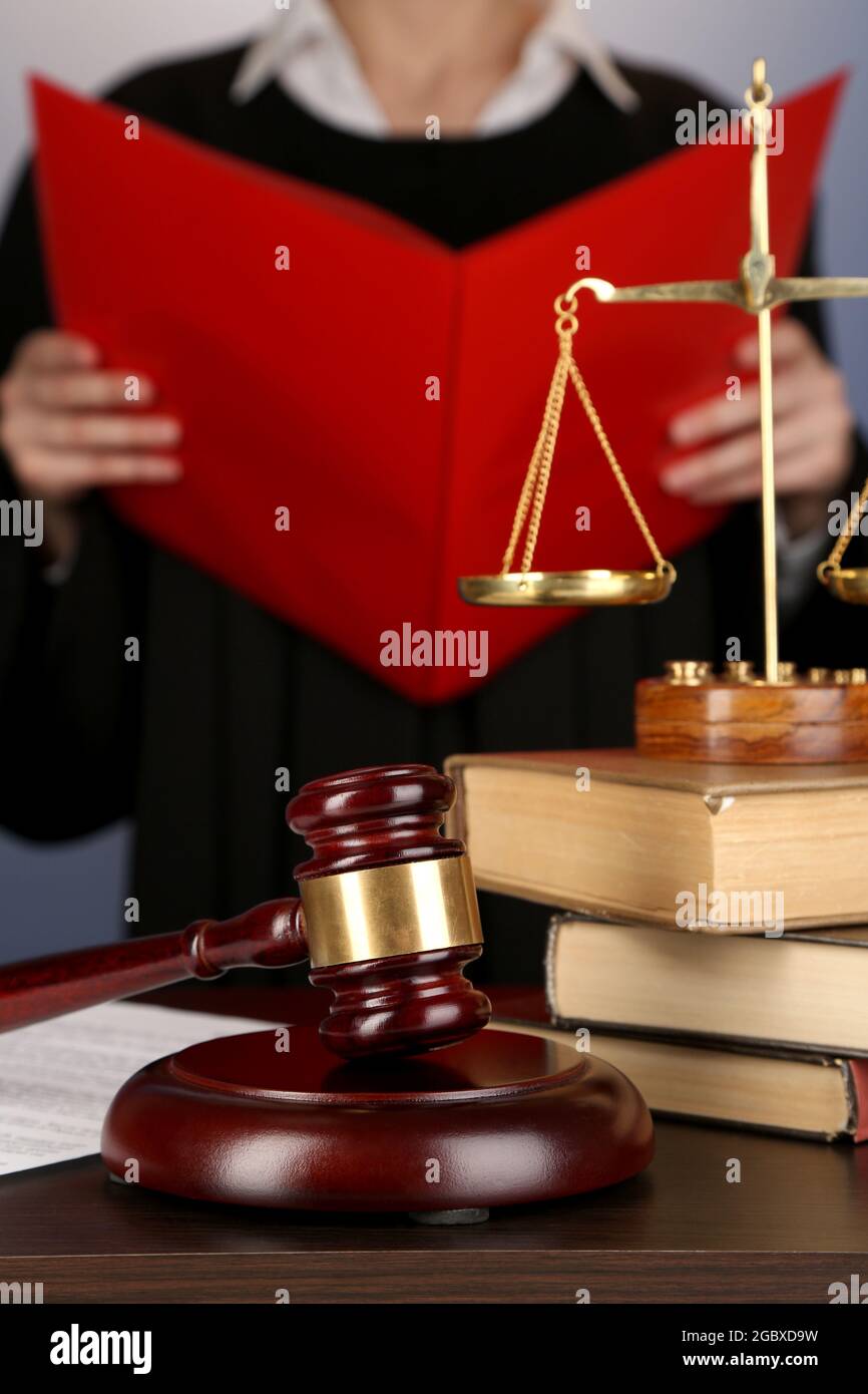 Judge read verdict on purple background Stock Photo - Alamy