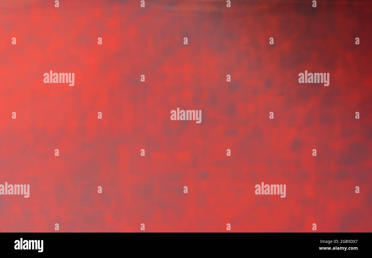 A dynamically glowing red background with stripes running through it ...