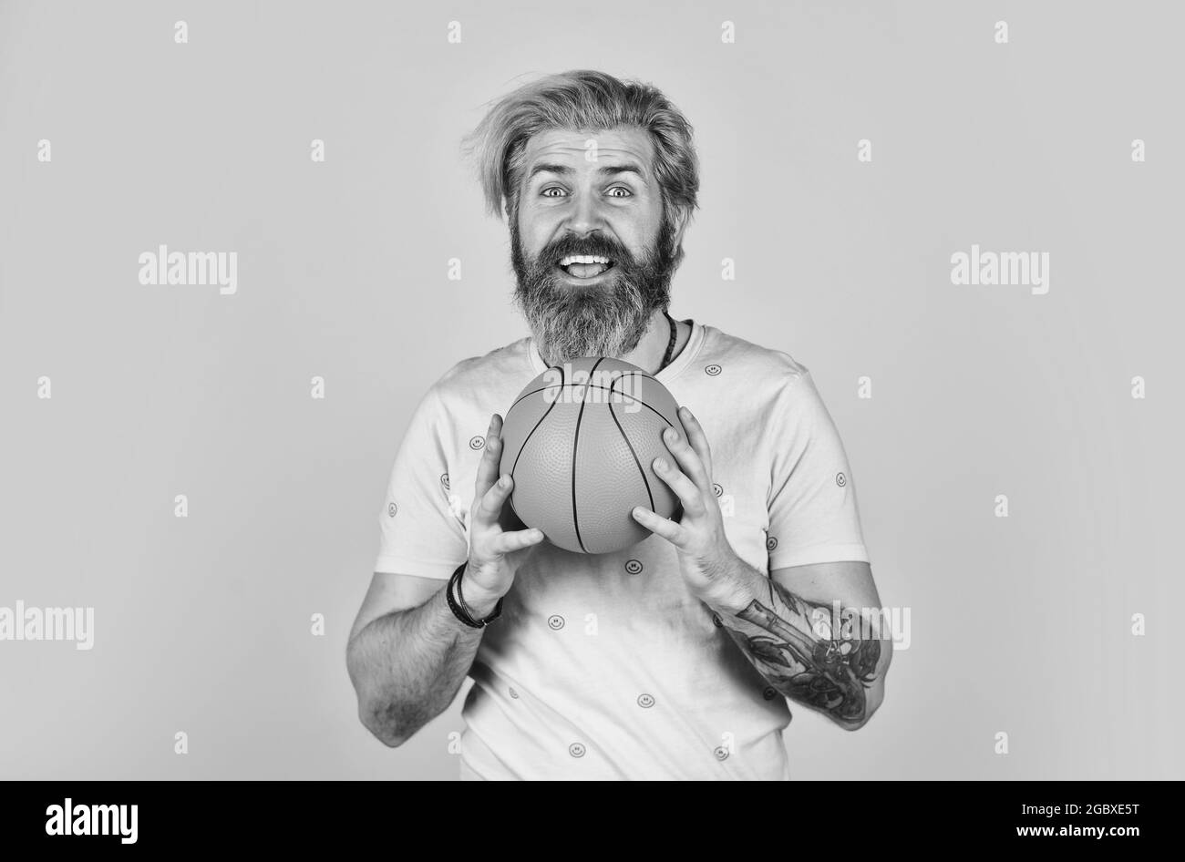 Sport concept. Enjoy game. Play with basketball ball. Happy man playing ...