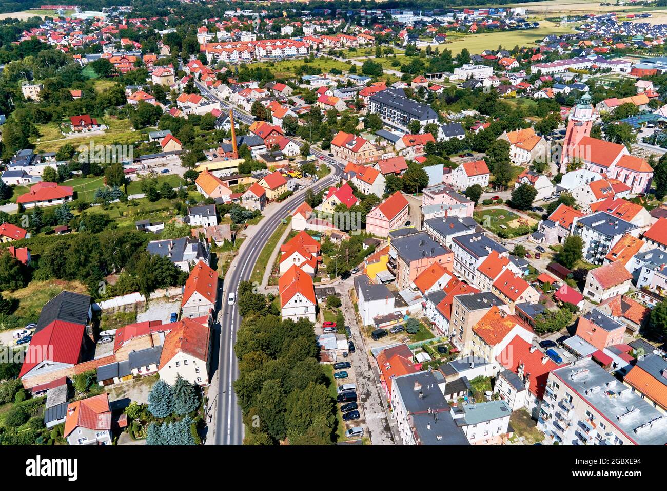 Aerial view of small european city with city streets and residential ...