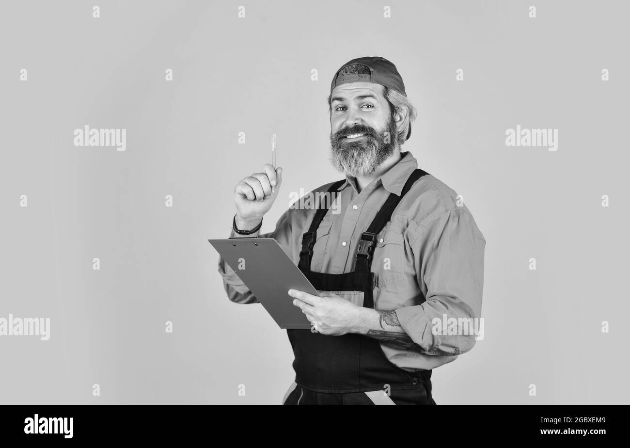 portrait of engineering man. construction worker holding folder ...