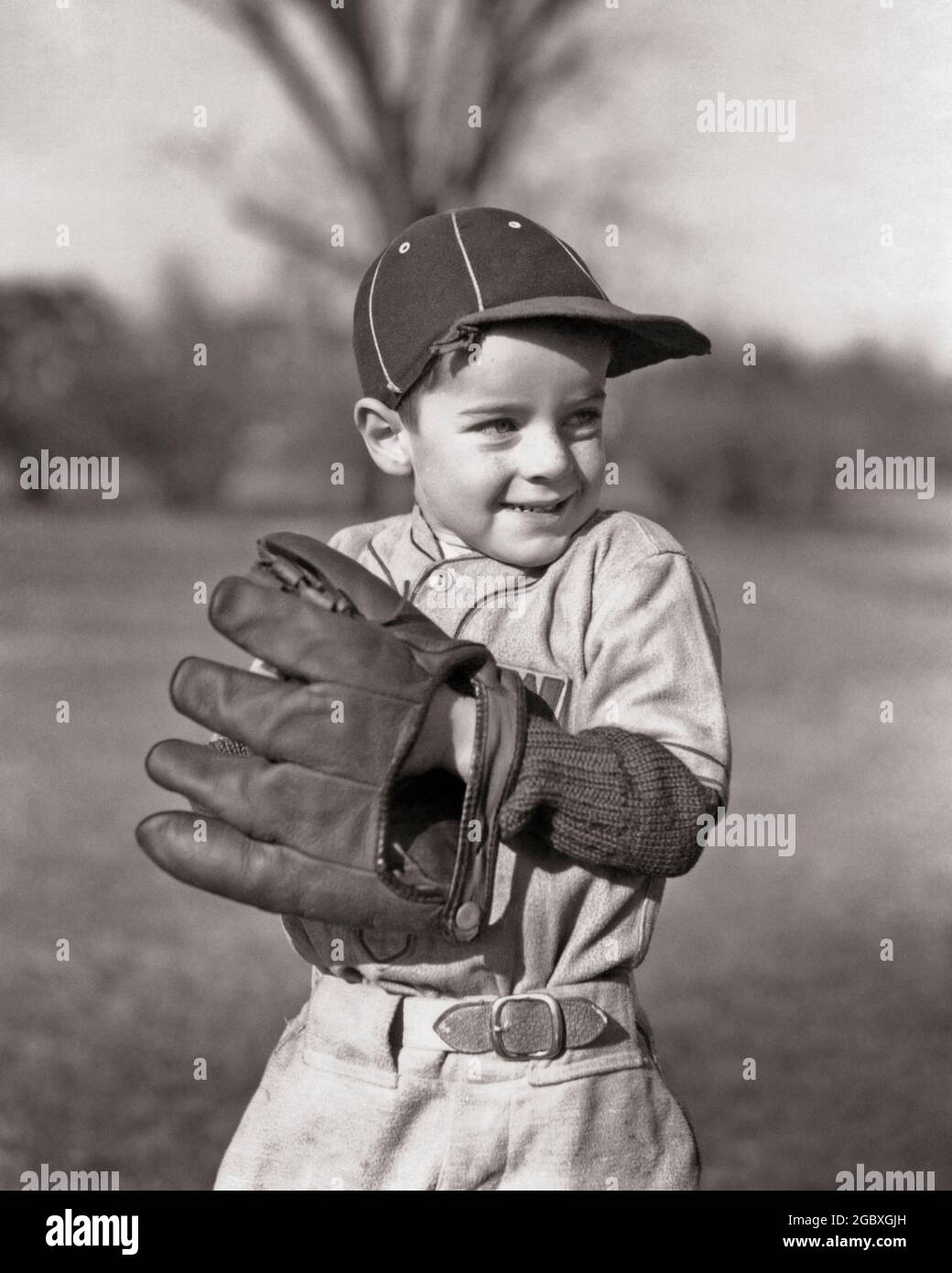 1930s SMILING EAGER BOY ATHLETE WITH HAND ME DOWN TOO BIG OVERSIZE ...