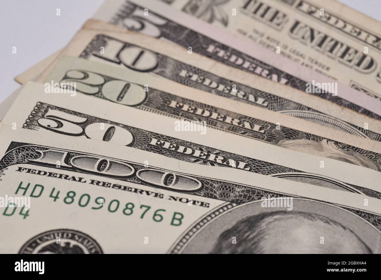 In this photo illustration, 5, 10, 20, 50 & 100 American dollar bills ...
