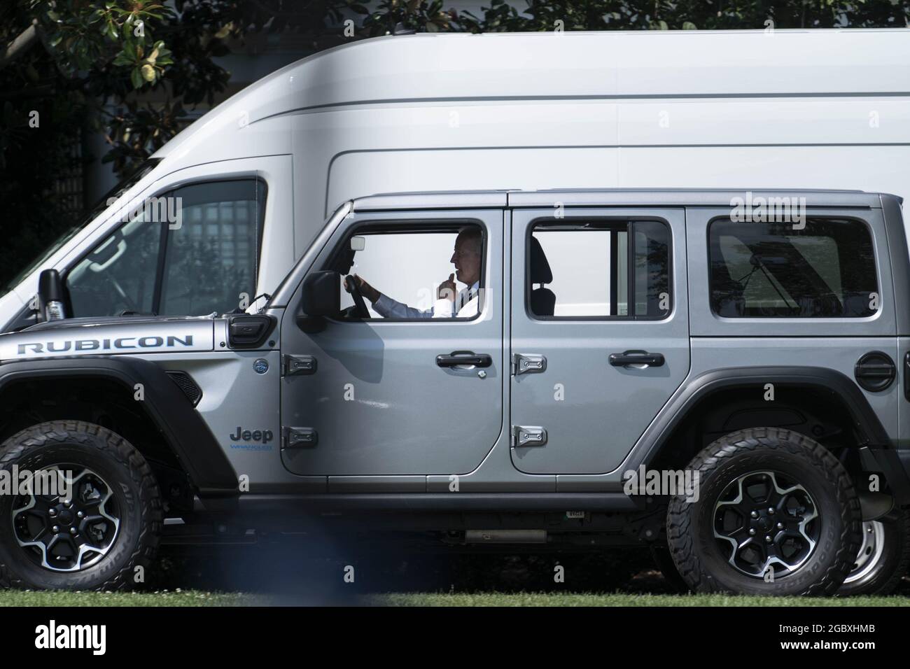 Washington, United States. 05th Aug, 2021. President Joe Biden drives a ...